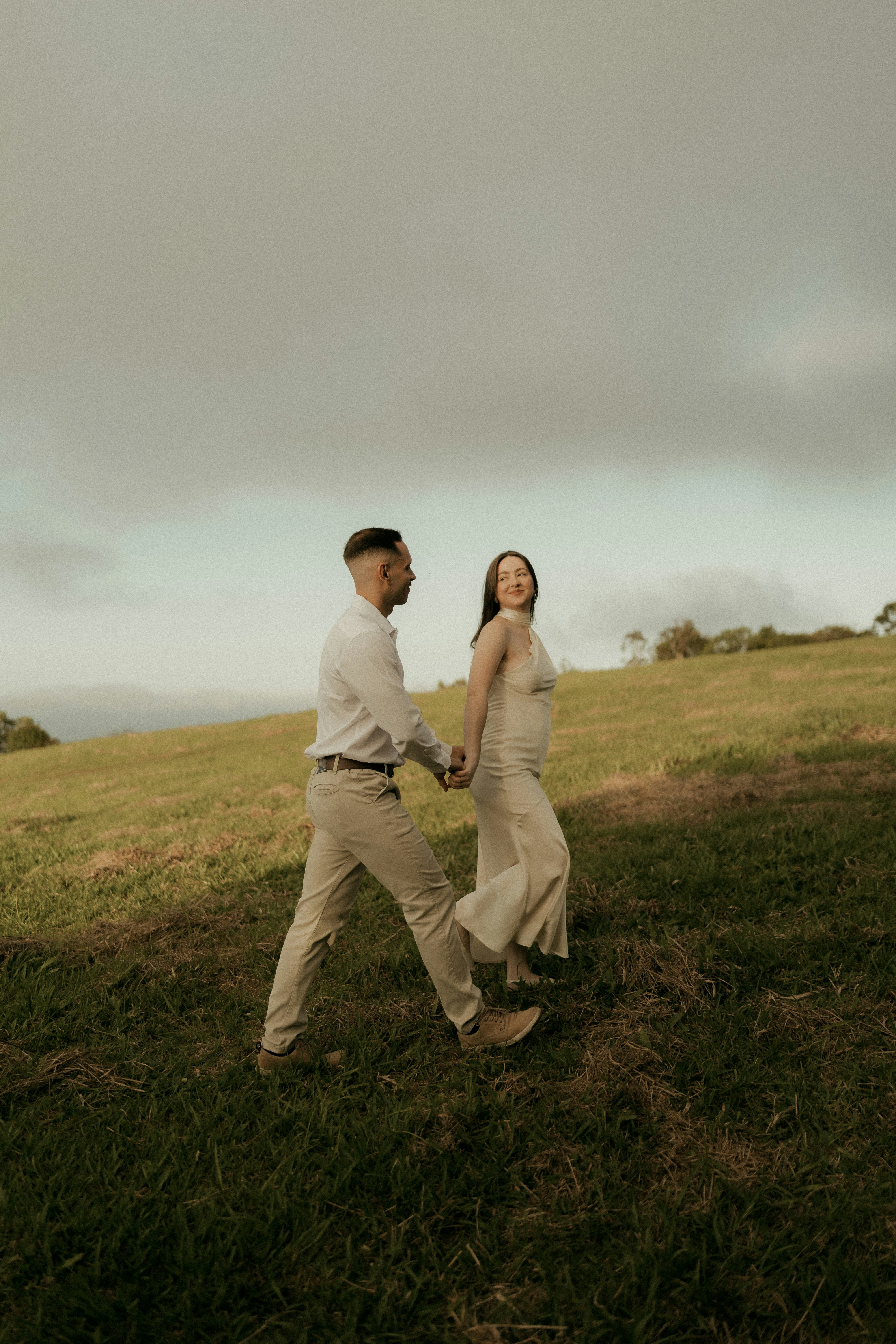 Holding Hands, Walking Uphill: A Quiet Moment in the Meadow