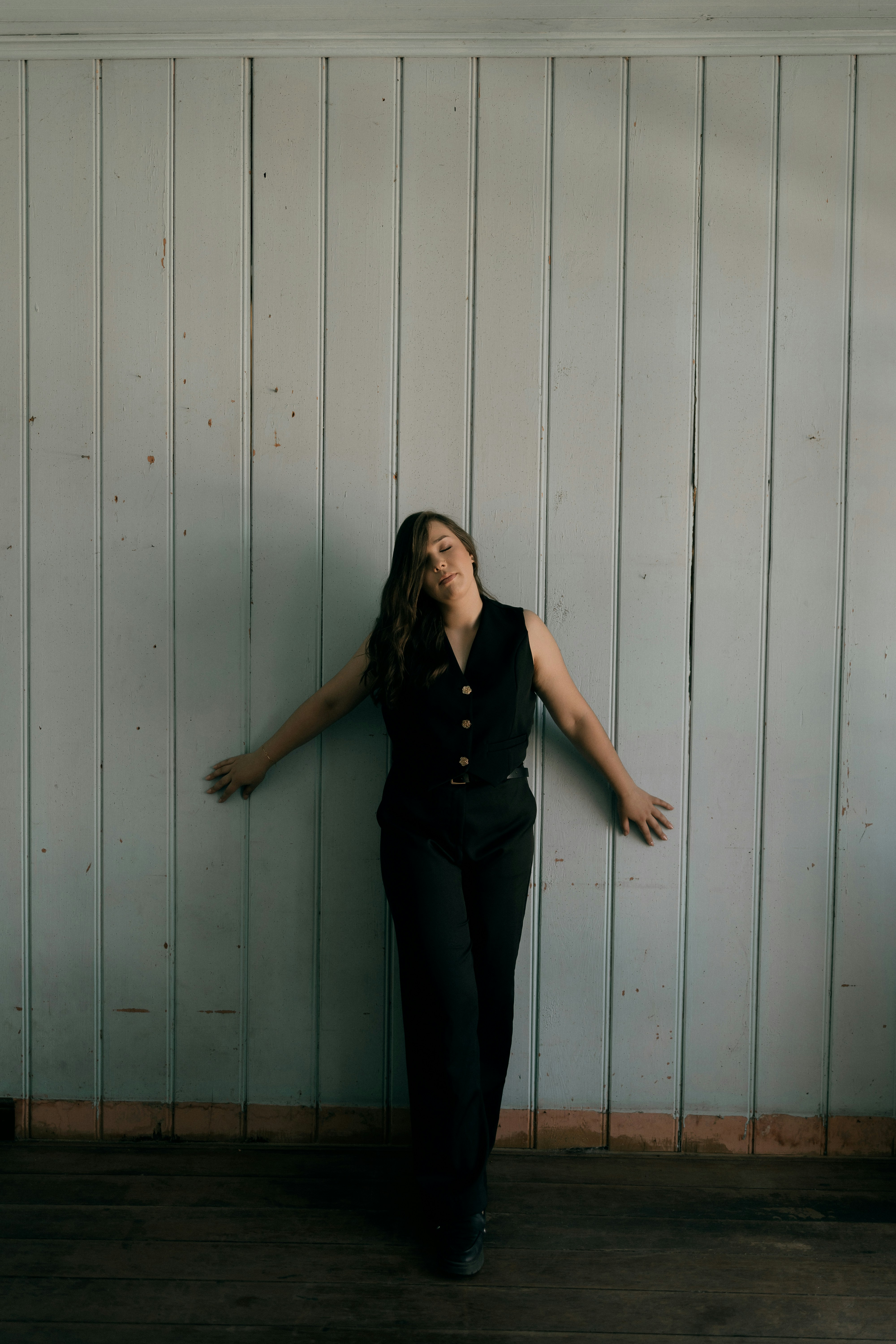 Centered Against the Planks: A Quiet Stance in Steel Blues