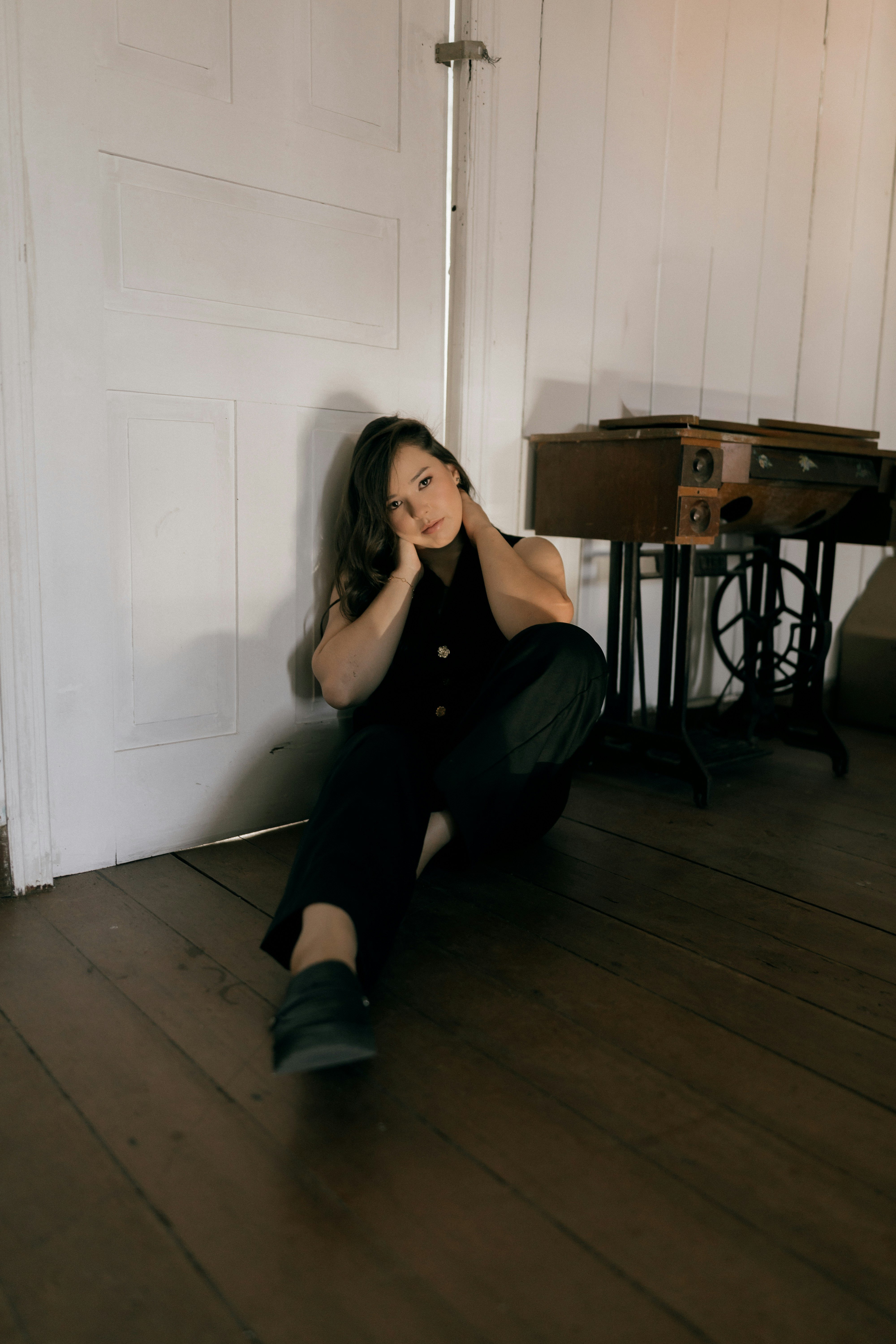 Sitting in Stillness: Portrait in a Quiet Studio