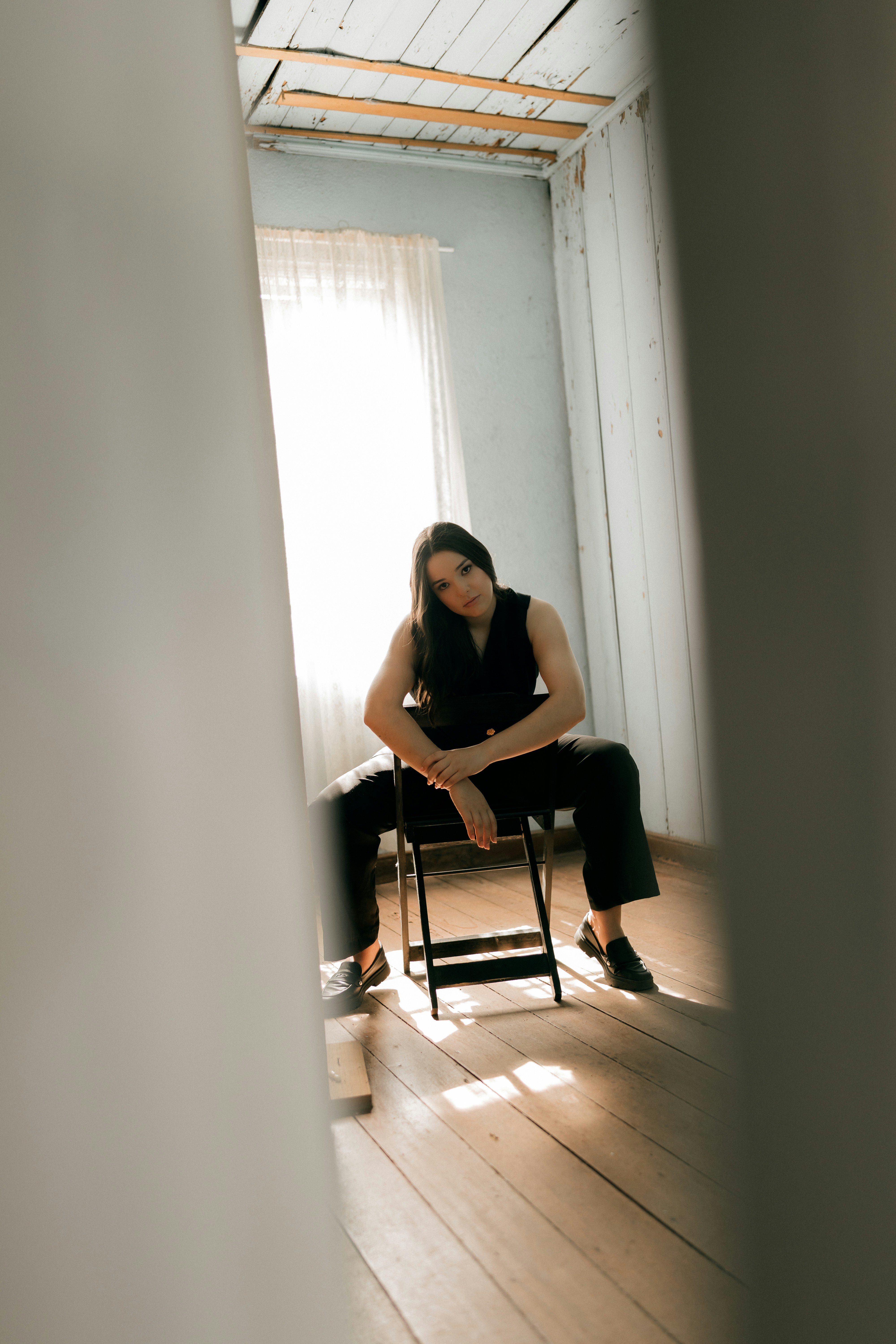 Portrait in a Narrow Sunlit Room