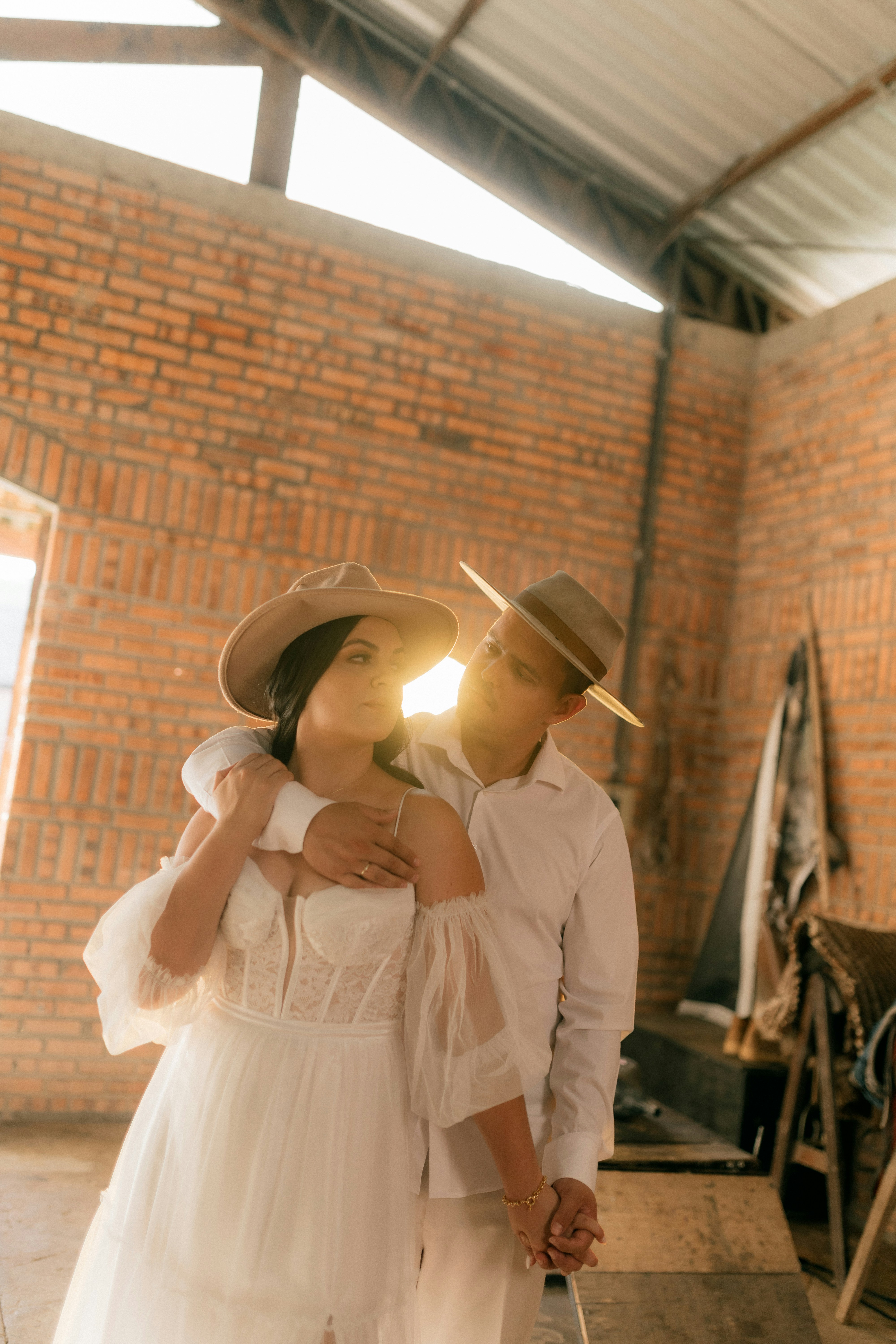Wrapped in Light: A Gentle Embrace in an Industrial Sunlit Loft
