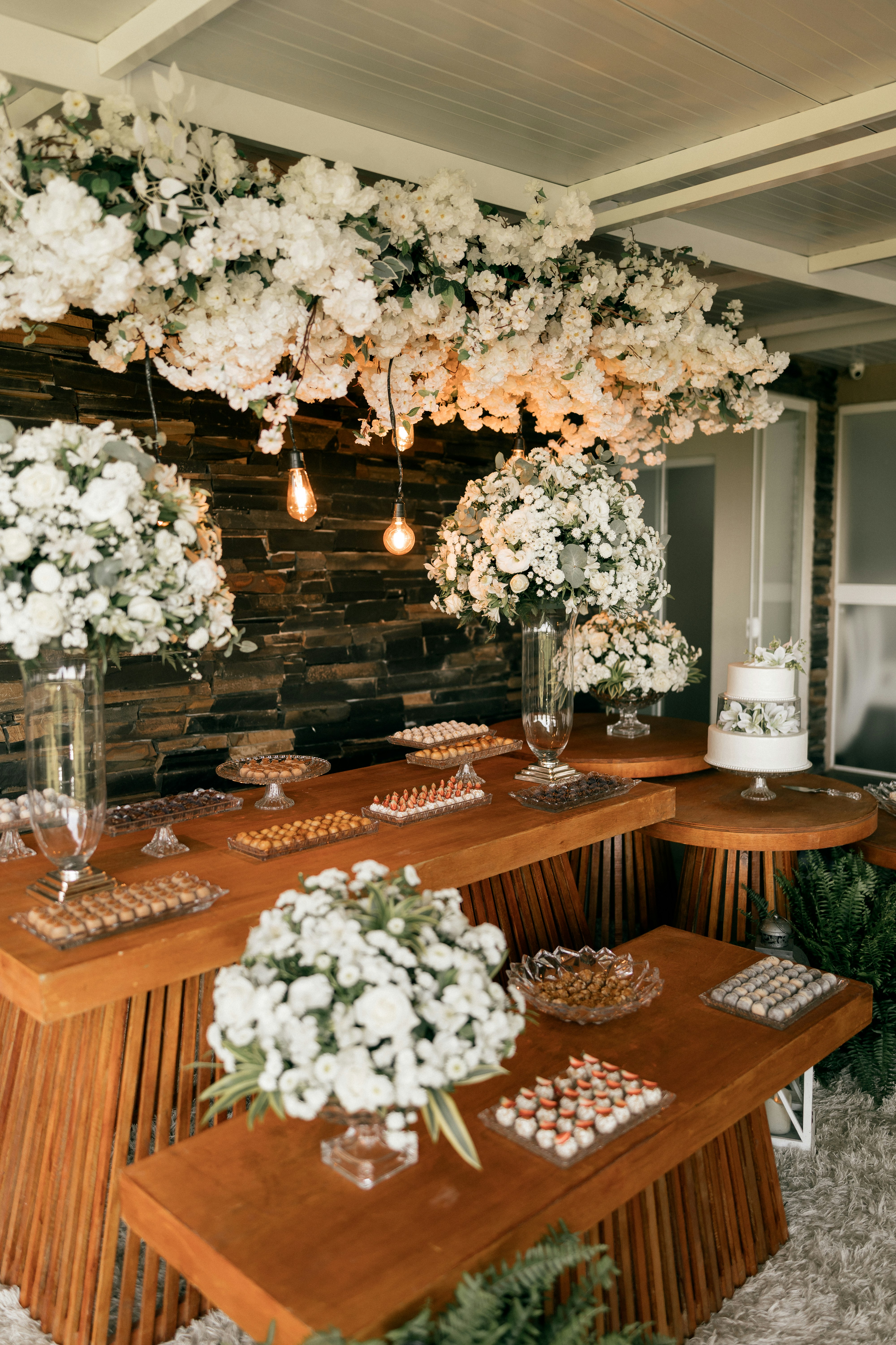 Floral Cascade and Dessert Bar Under Soft Gloaming Lights