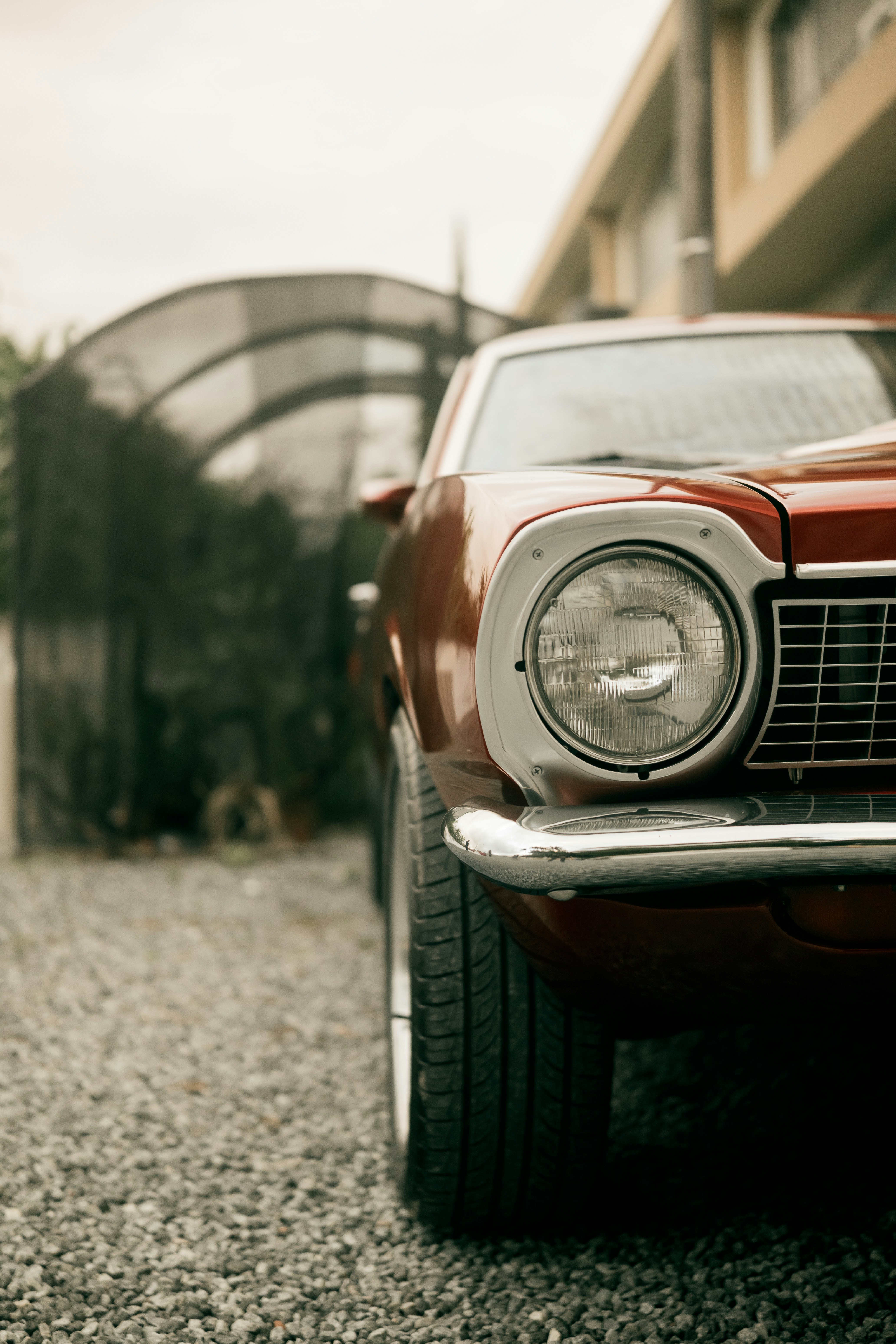 Portrait of a Vintage Red Mustang: Front Quarter with Focused Glisten