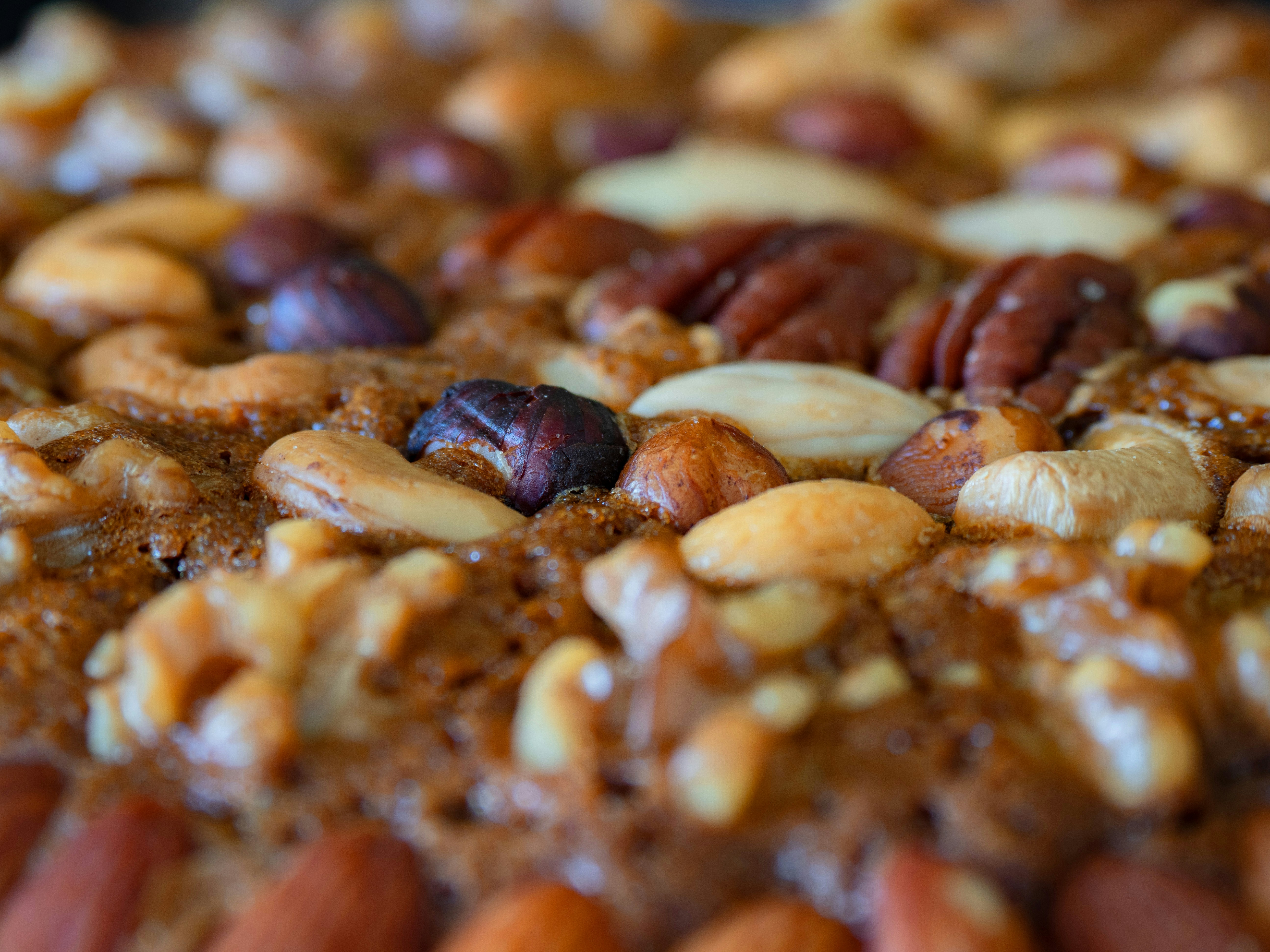 Nutty Mosaic: A Golden-Hued Crunch of Mixed Nuts