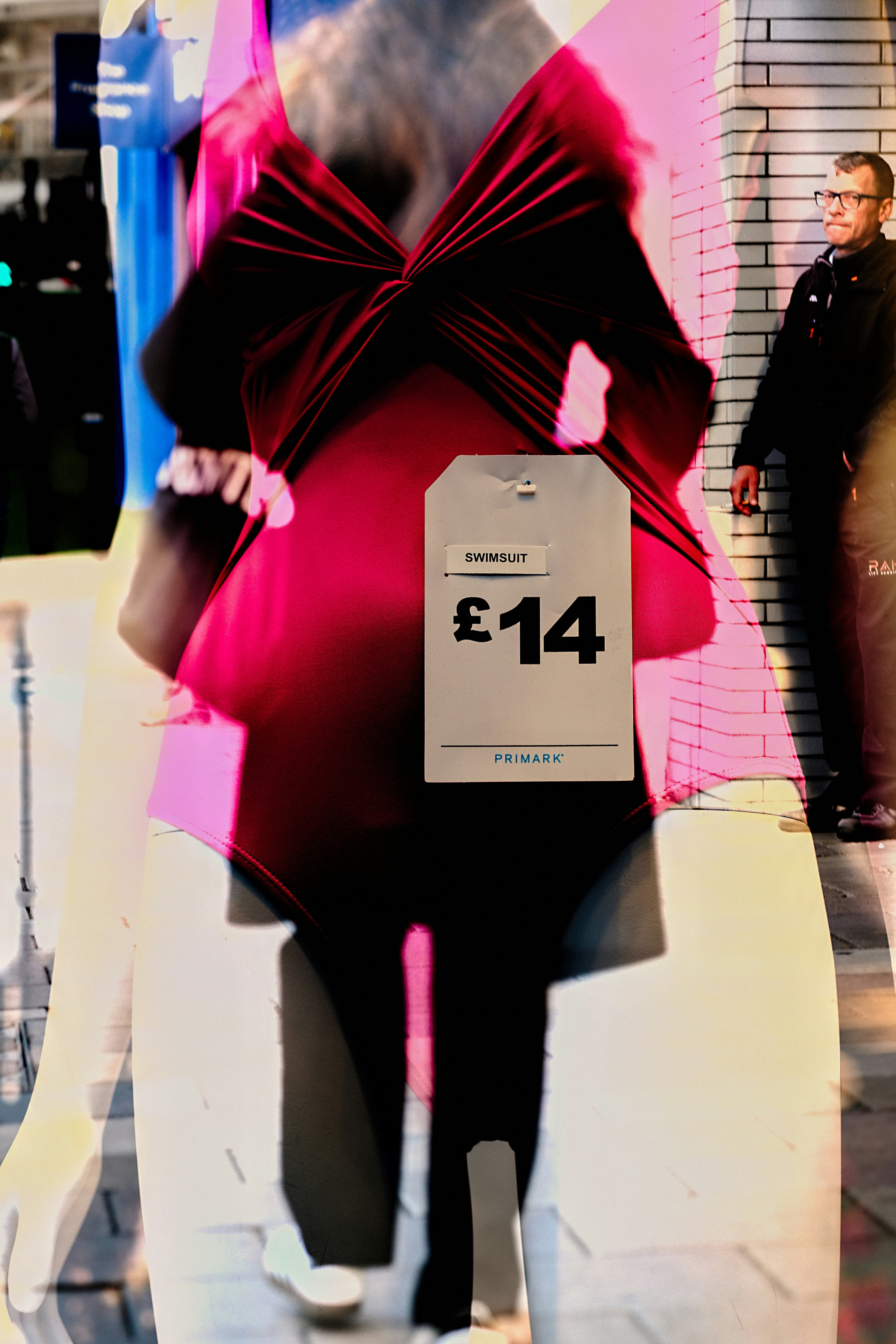 Vivid Stripe of Fashion: A Glowing Red Dress on Display