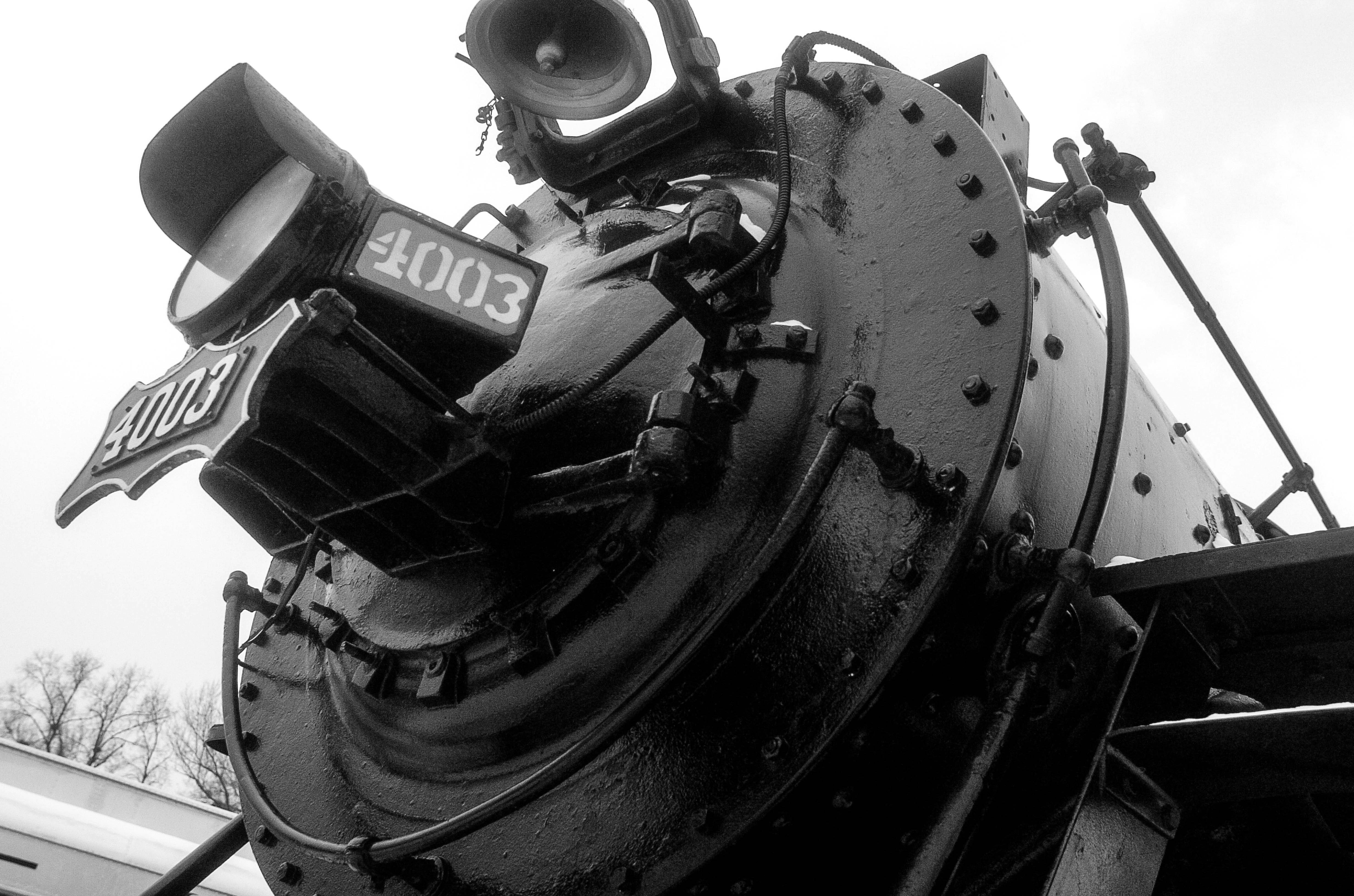 Close-up of a vintage steam train's front