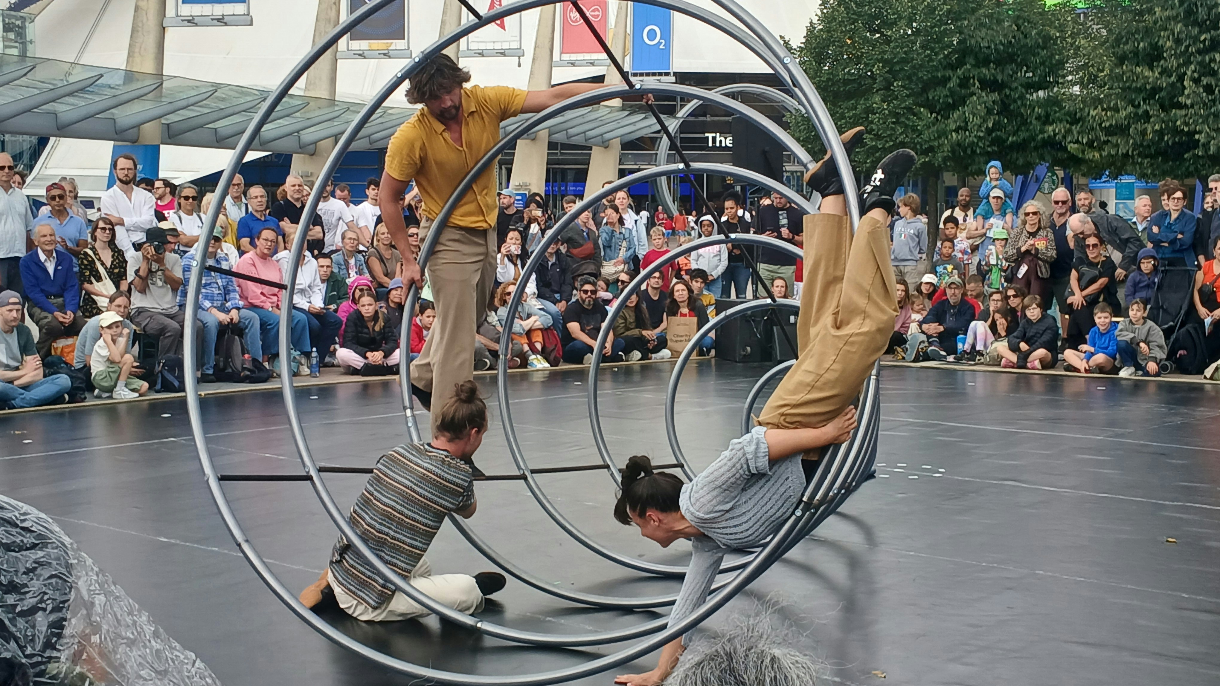 Circling Ring of Motion: A Street-Circus Performance in Public Square