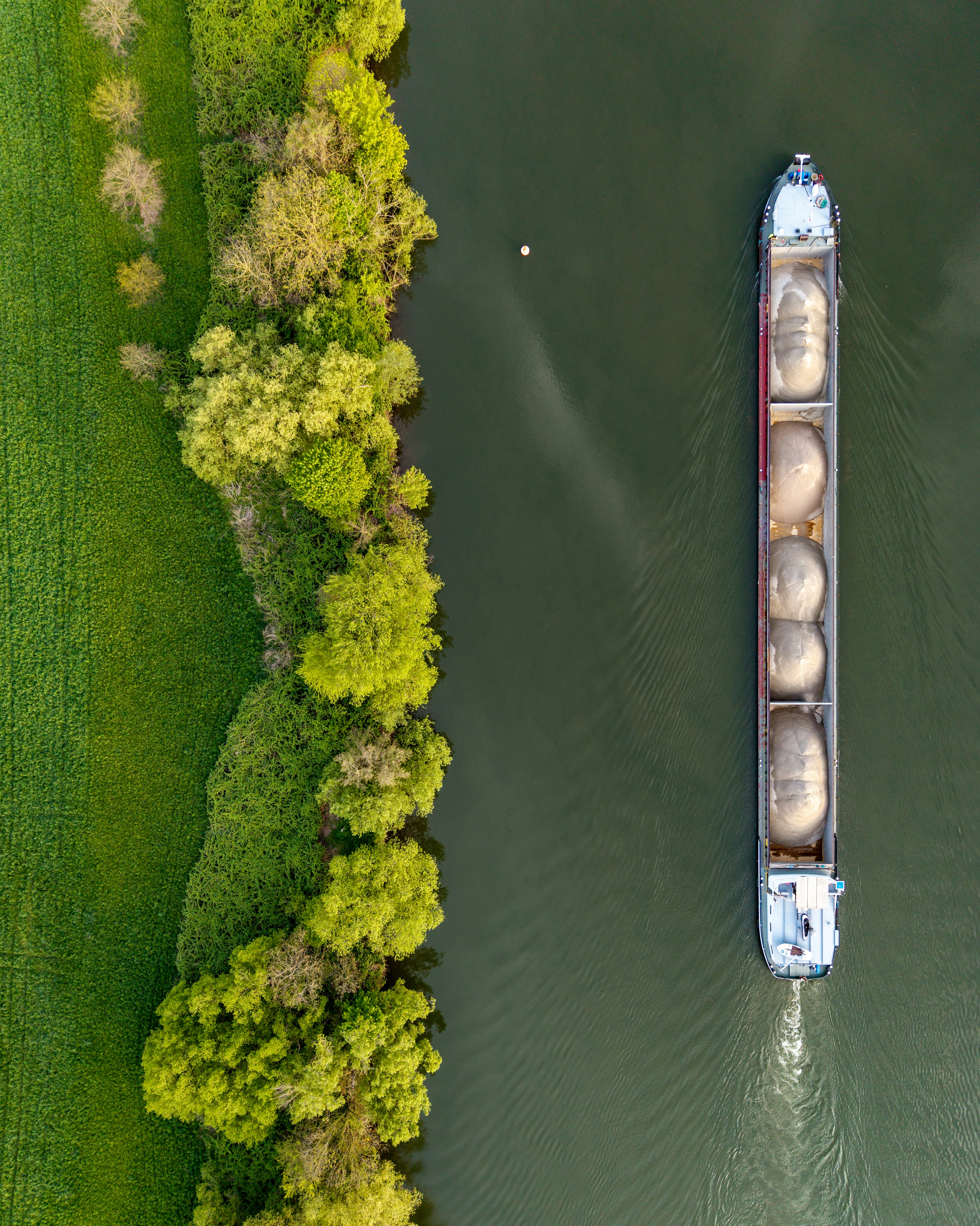 Aerial River Cargo: Lime Tree Corridor and Barge Glide