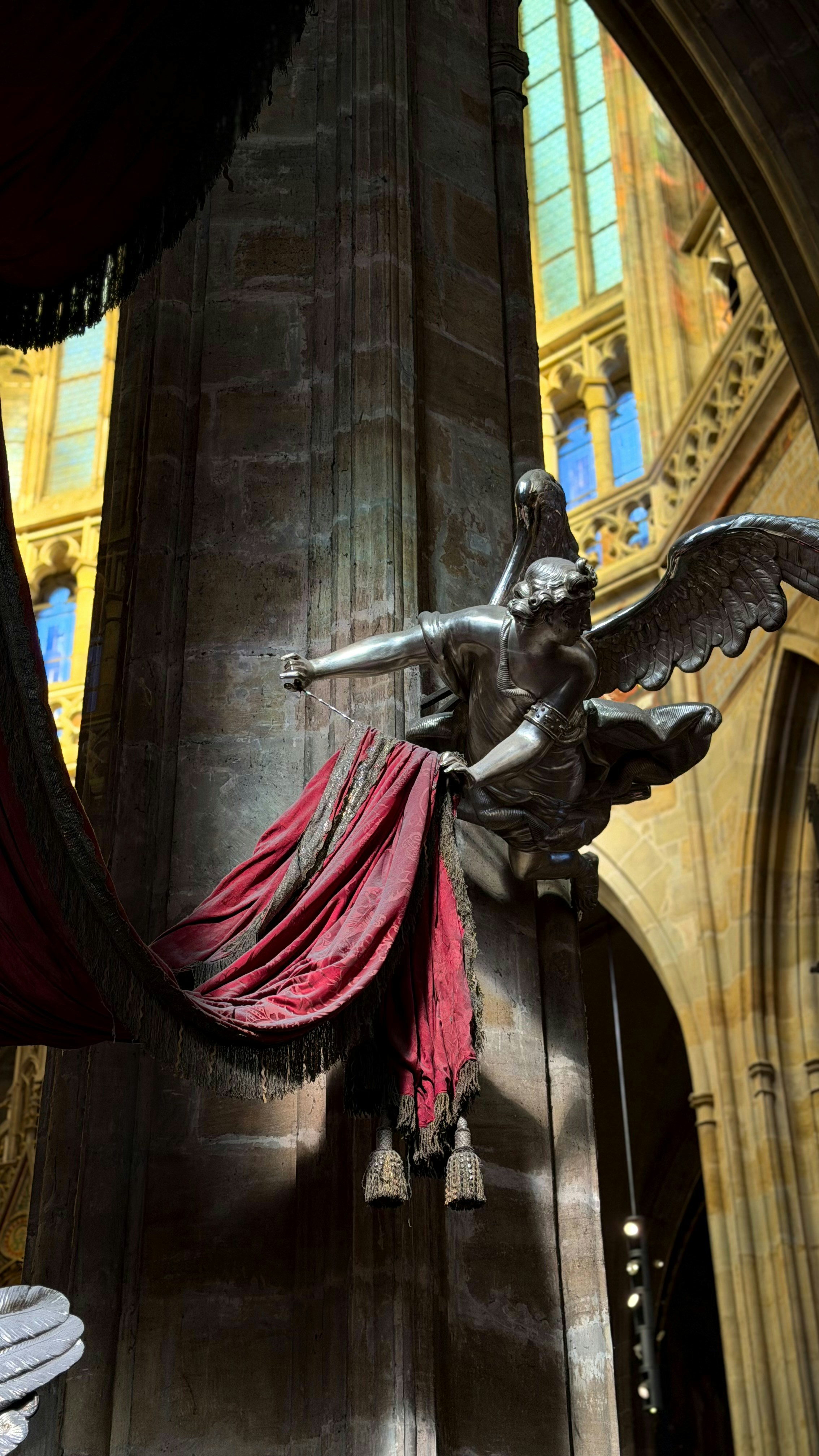 Winged Statue in Dim Cathedral Climb