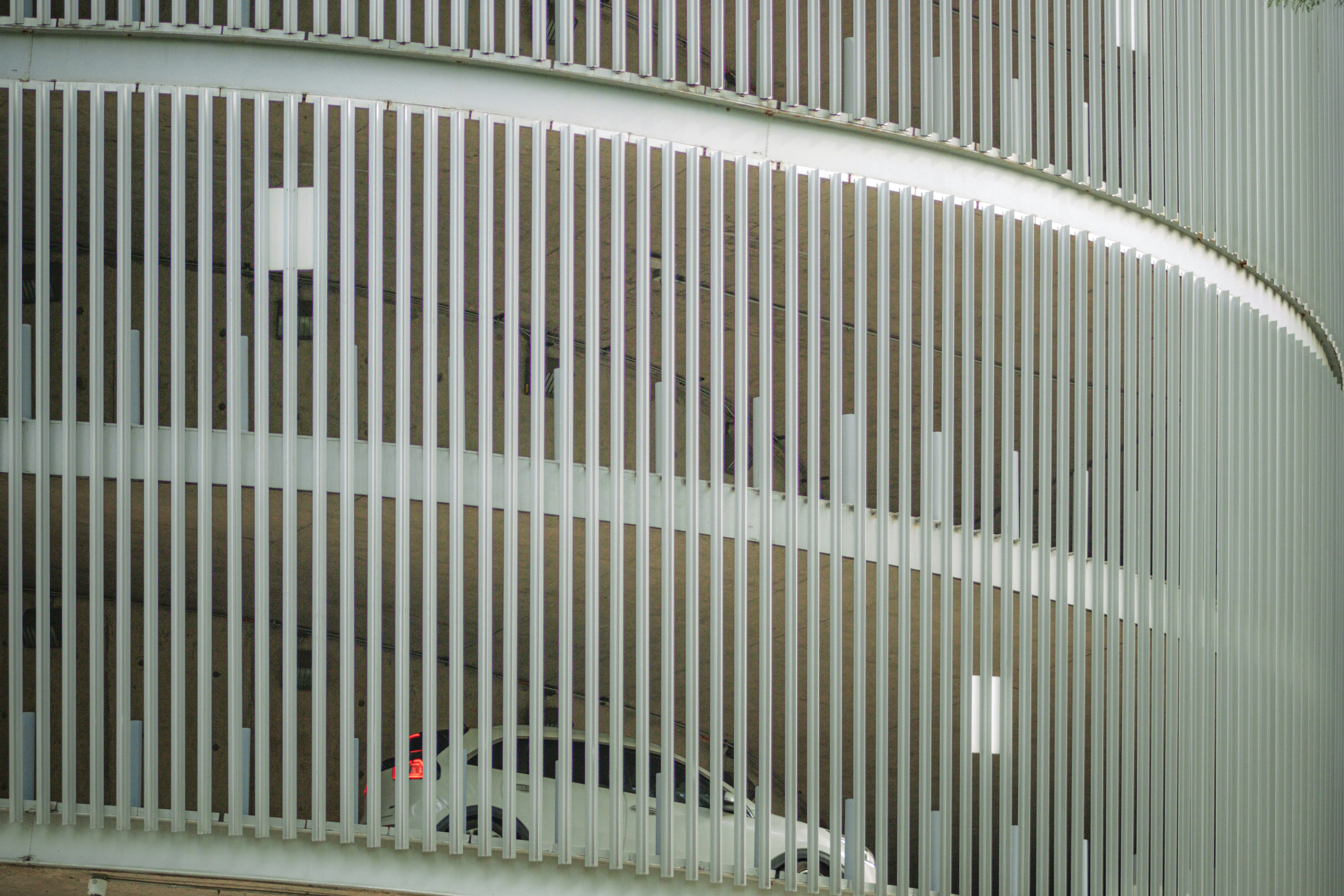 Hidden Car Through a Veil of Vertical Slats