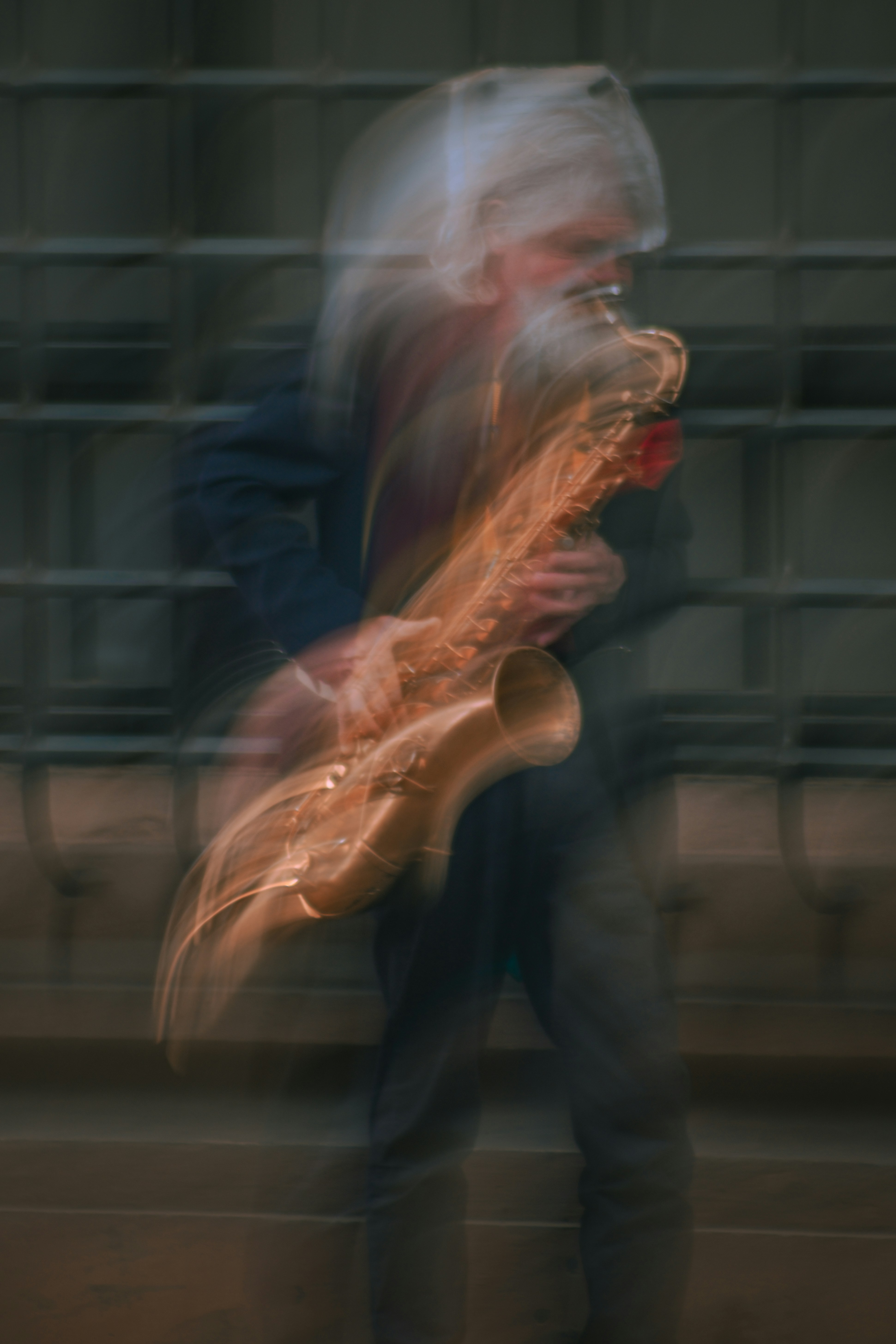 Blur of Brass: A Saxophone Traveler in Motion