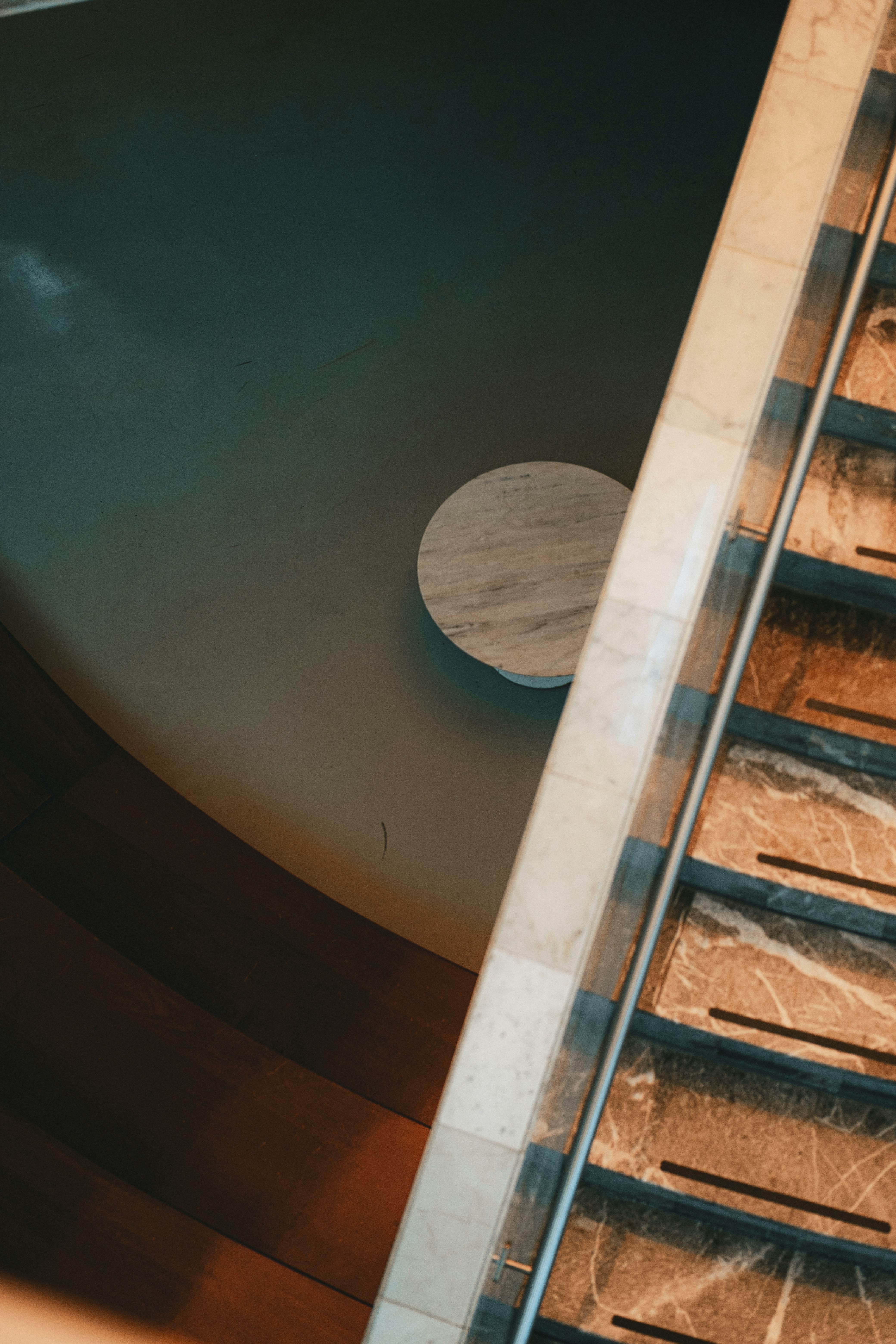 Circular Echoes: A Vertical Tour of Spiral Staircase and Glaring Light