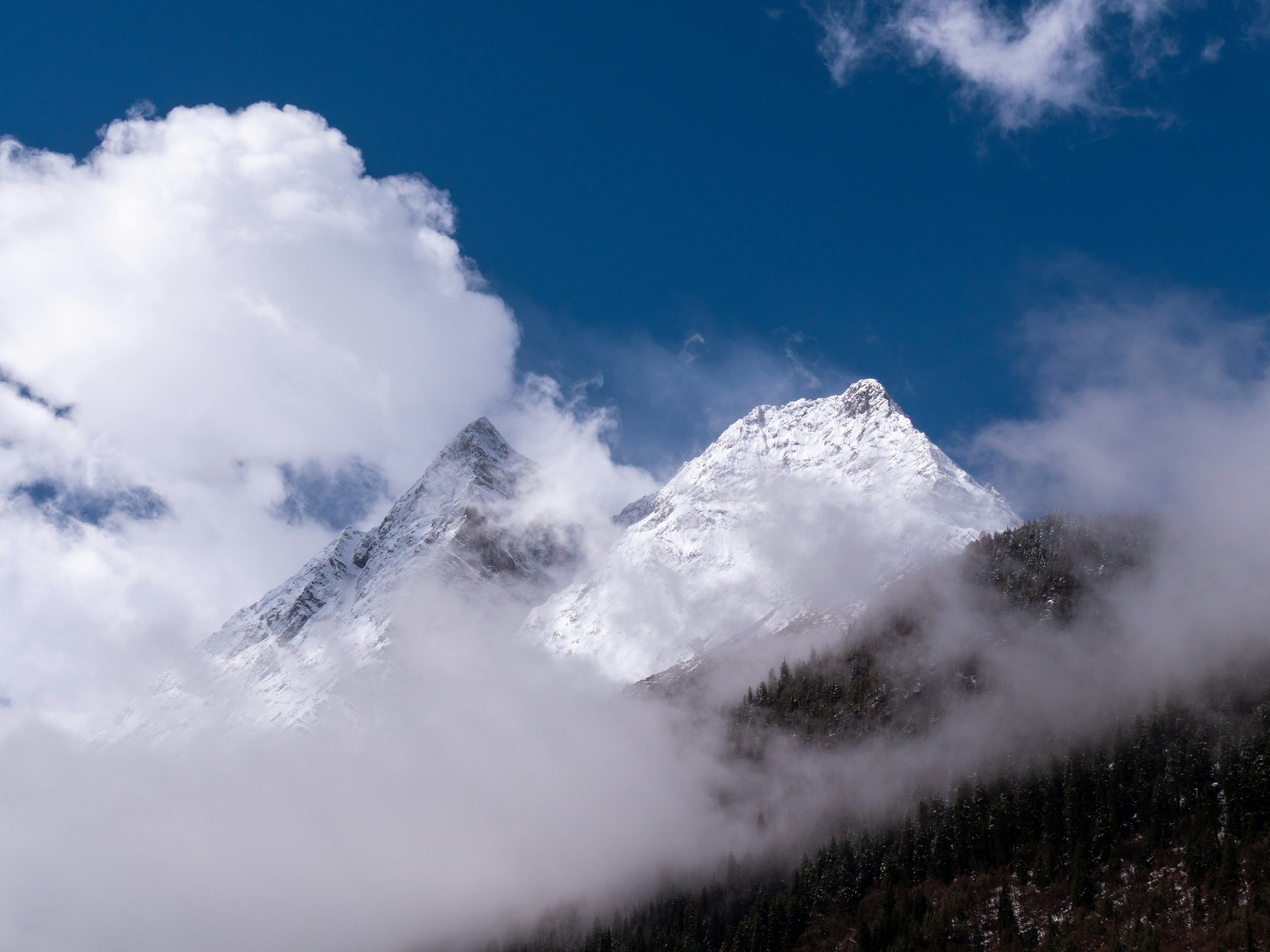 Snowbound Peak Pierced by Blue Sky