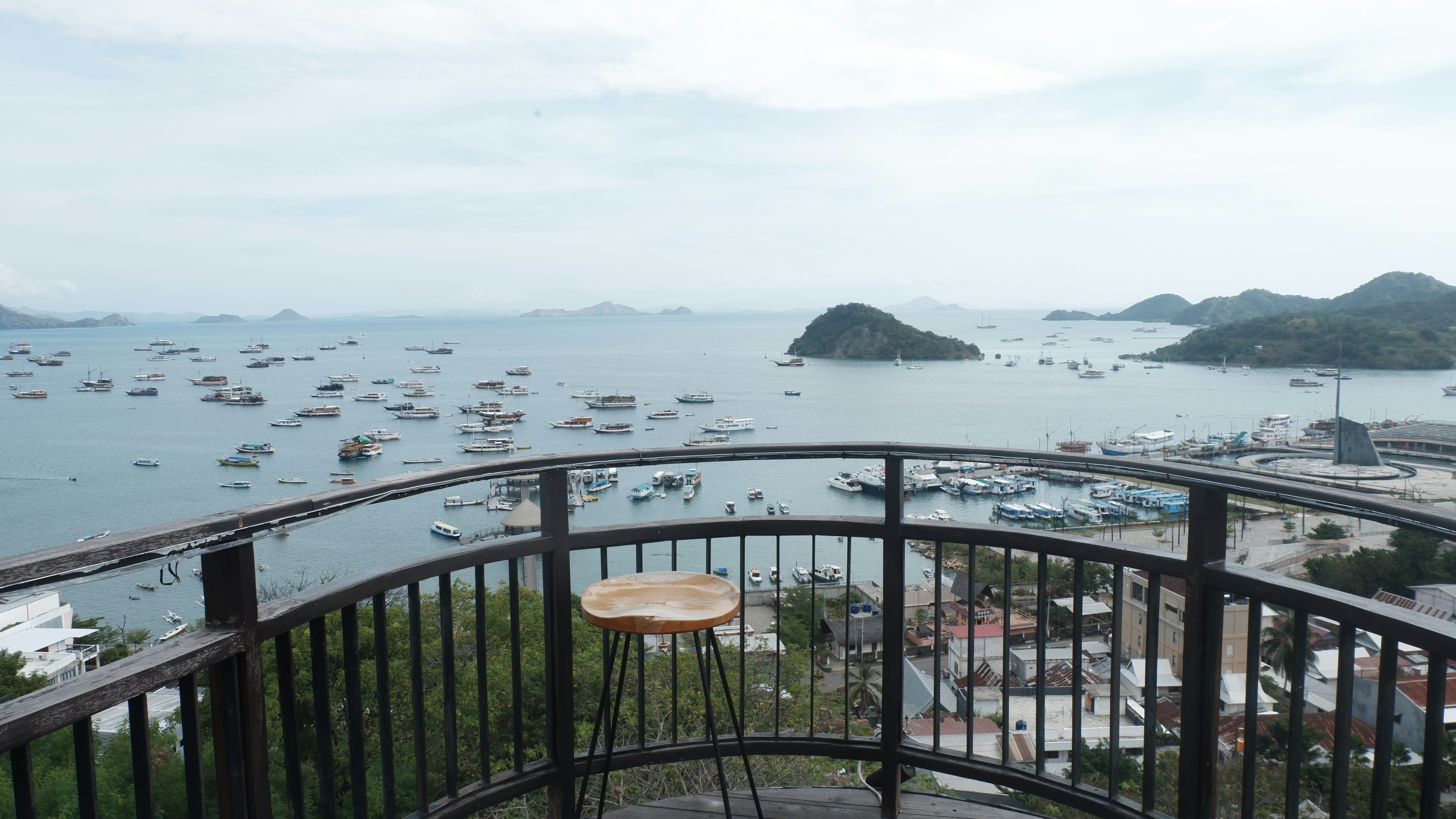 Harbor View from the Balcony: Boats and Islands in Soft Morning Light