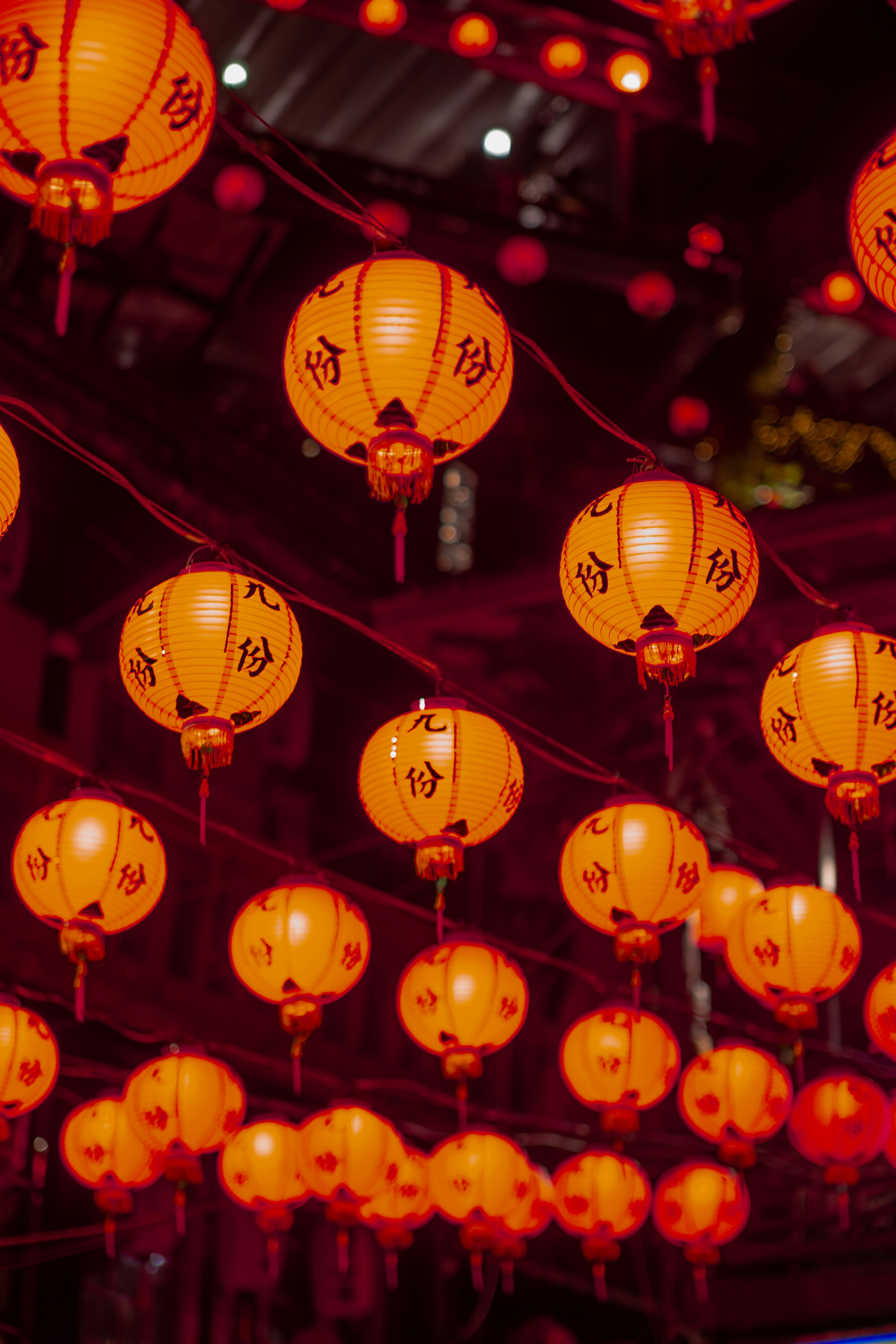 Lantern Parade: A Field of Glowing Orbs in Red and Gold