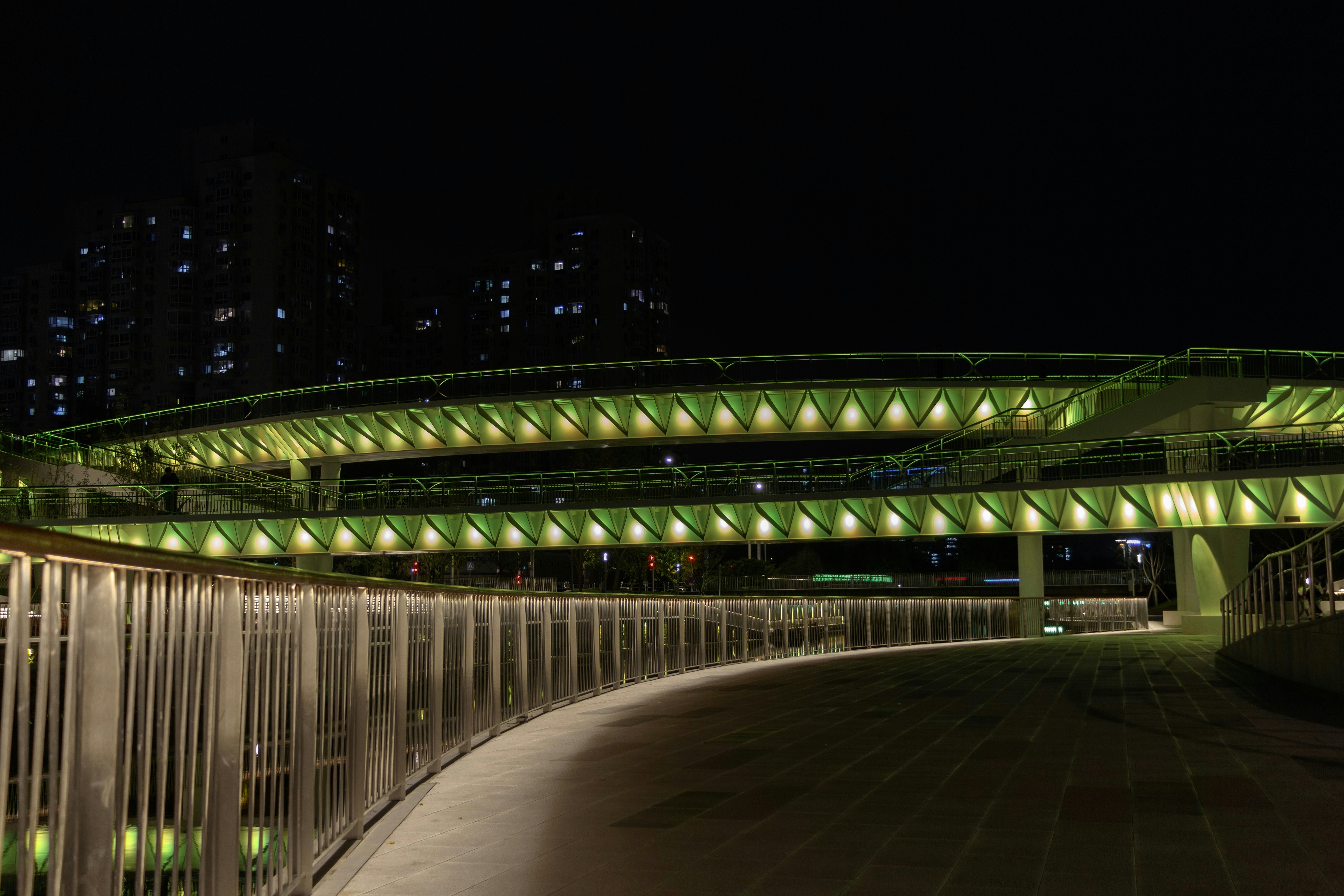 Neon Bridge at Night: A Quiet Walk Underward from the City