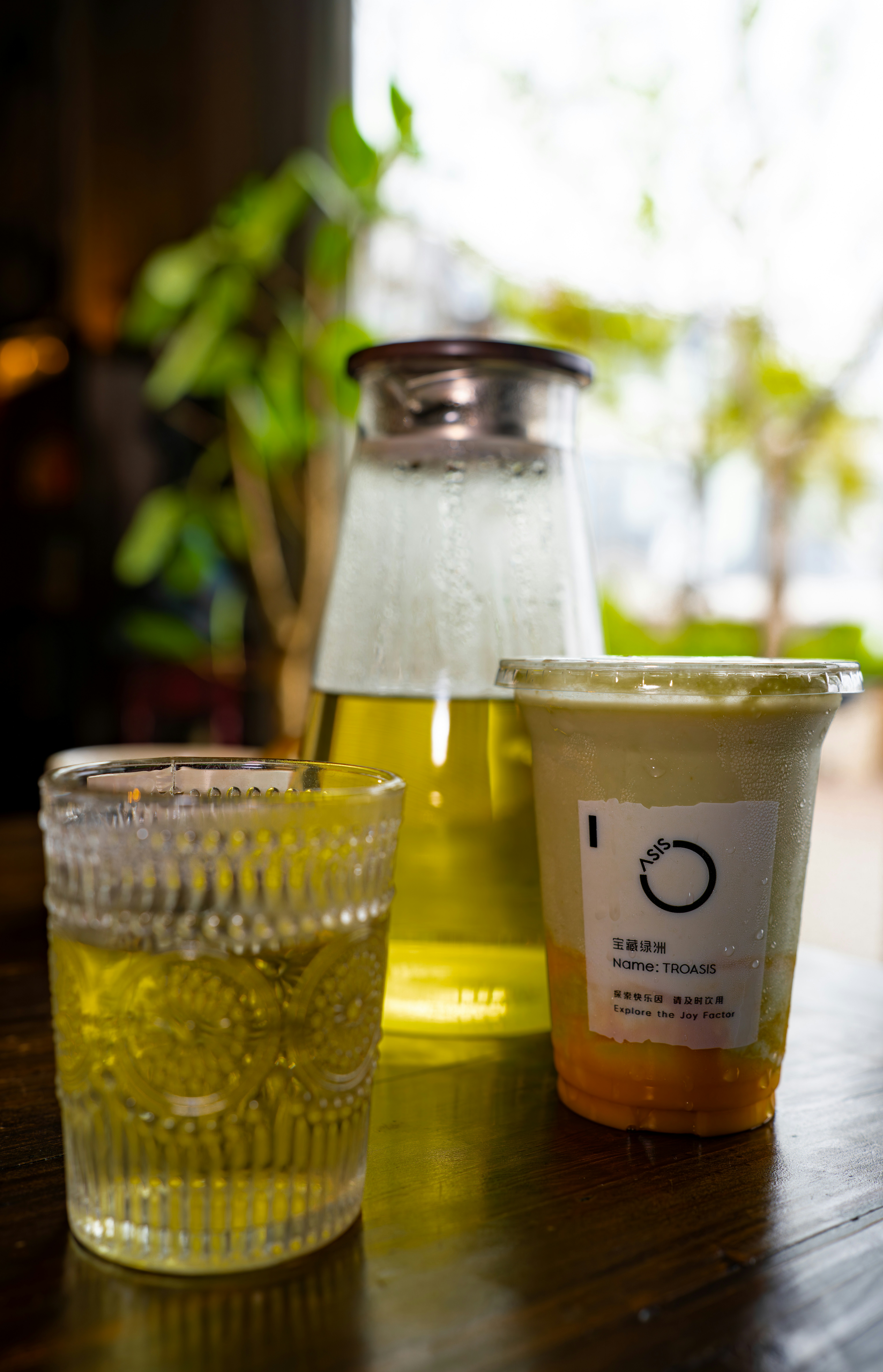 Glass and Tea on a Wooden Table with Soft Backlight