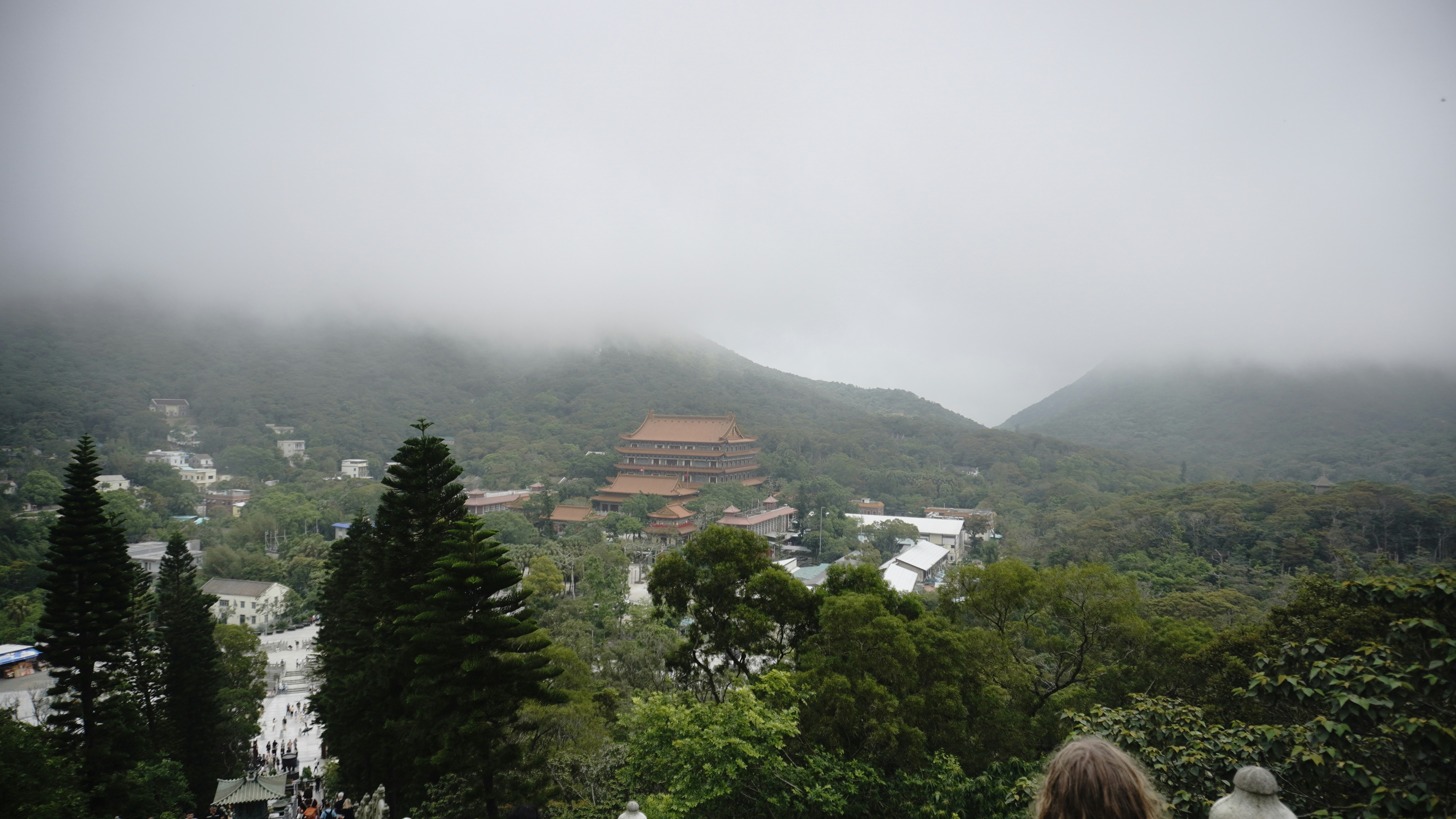 Mist-Softened Ridge and Temple: A Valley Shrouded in Quiet Morning