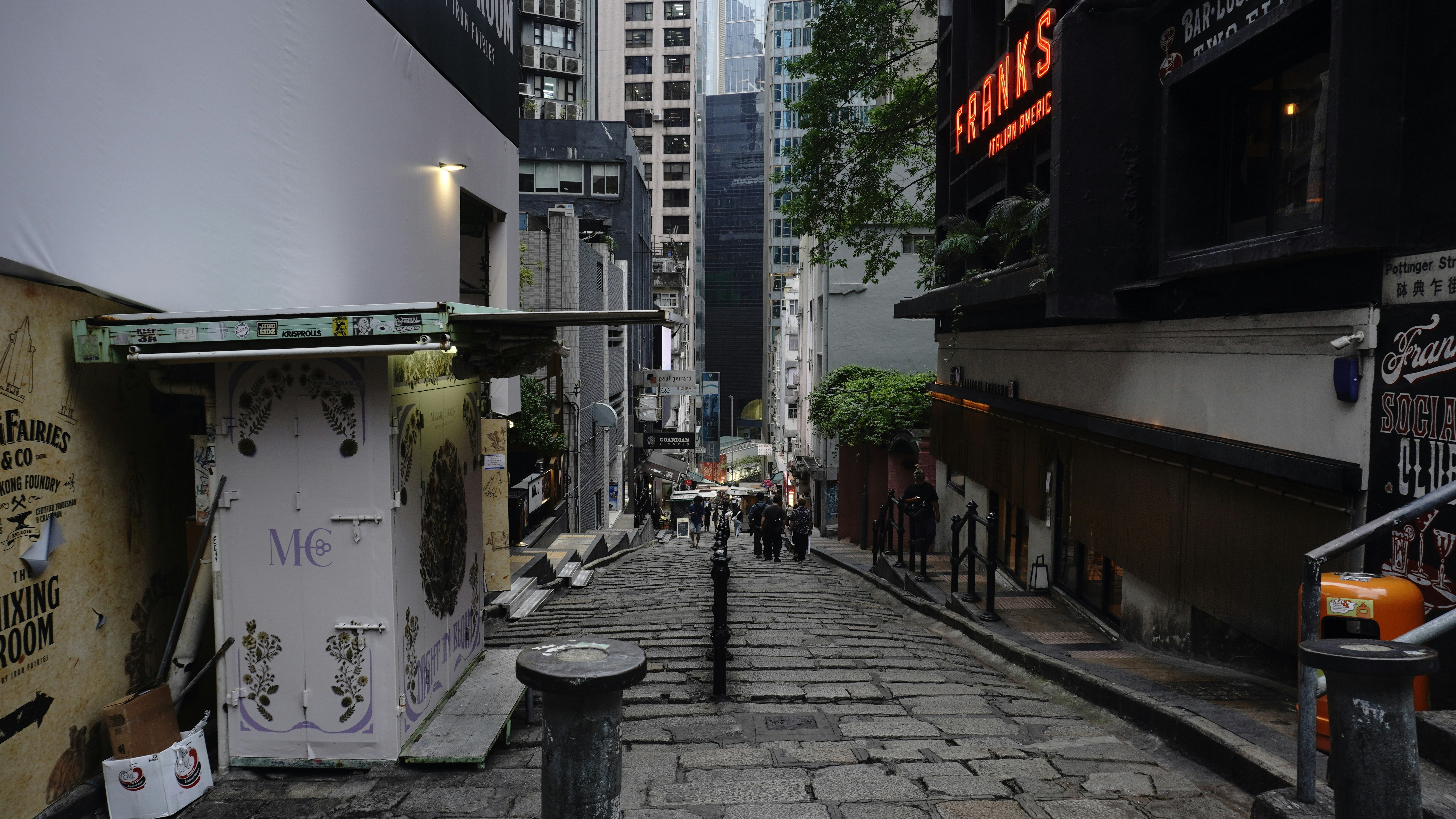 City Alley at Dusk: Steps Toward the Quiet Between Towers