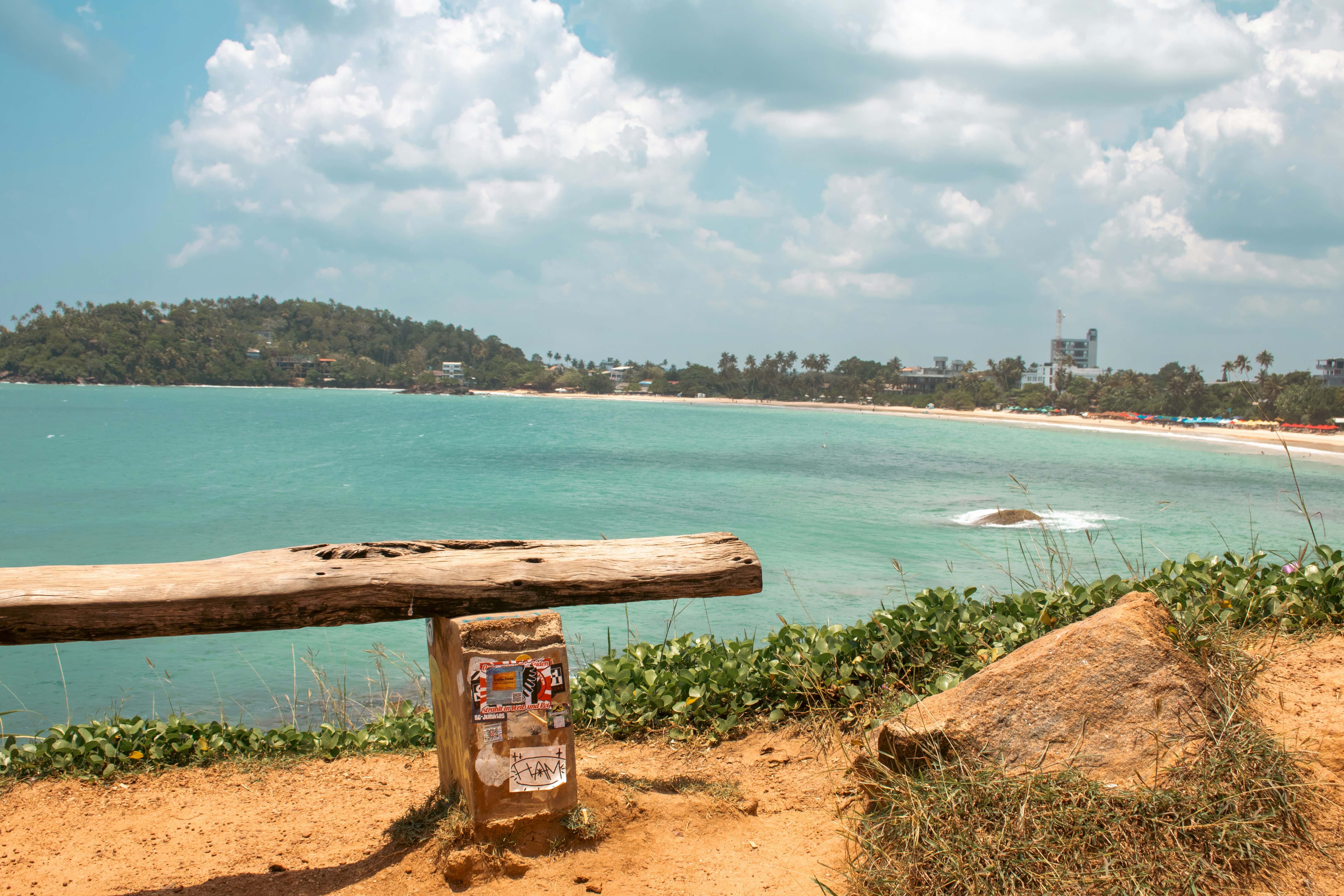 Seaside Bench Overlooking Turquoise Waters
