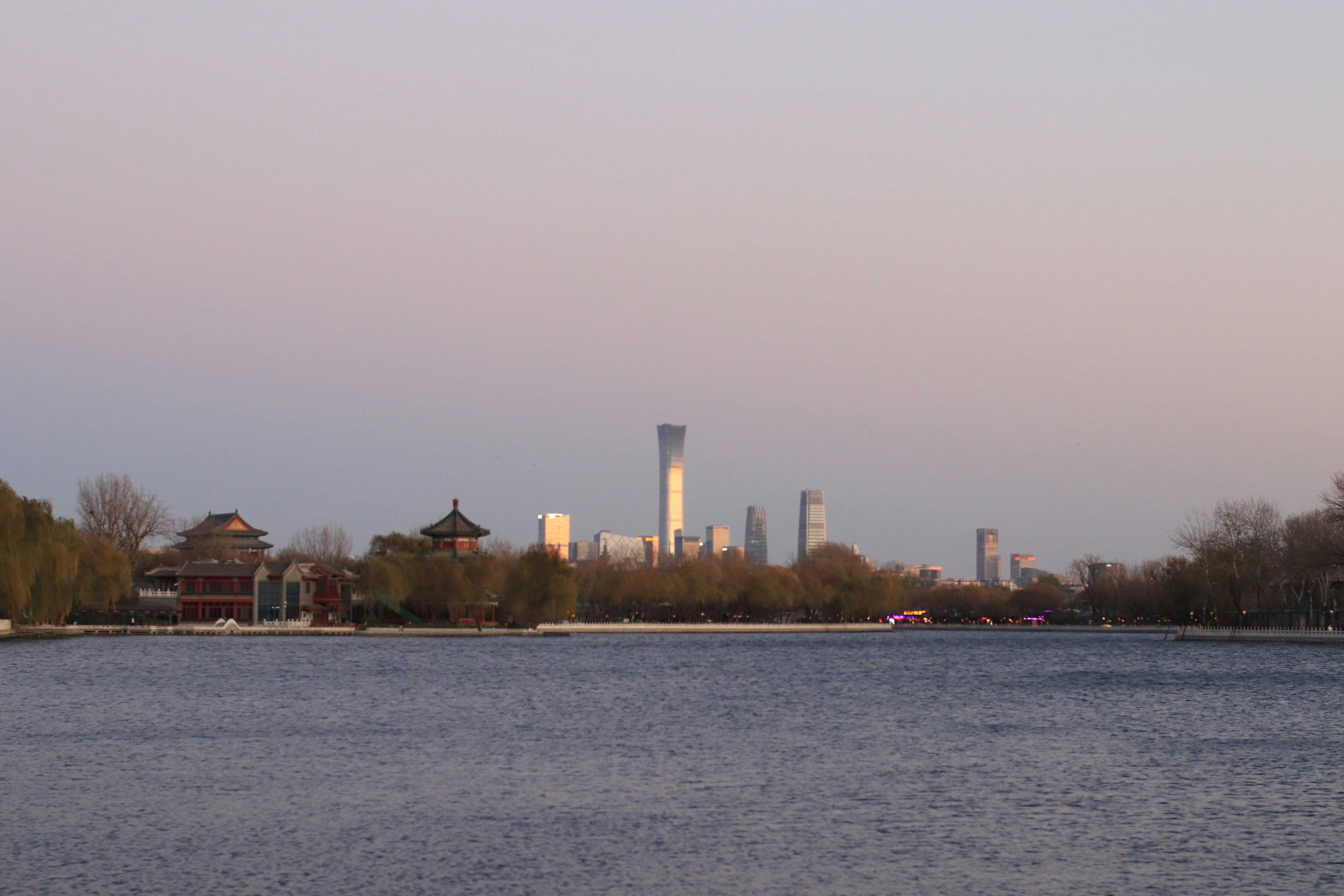 Distant Skyline Awakens Over a Tranquil Lake
