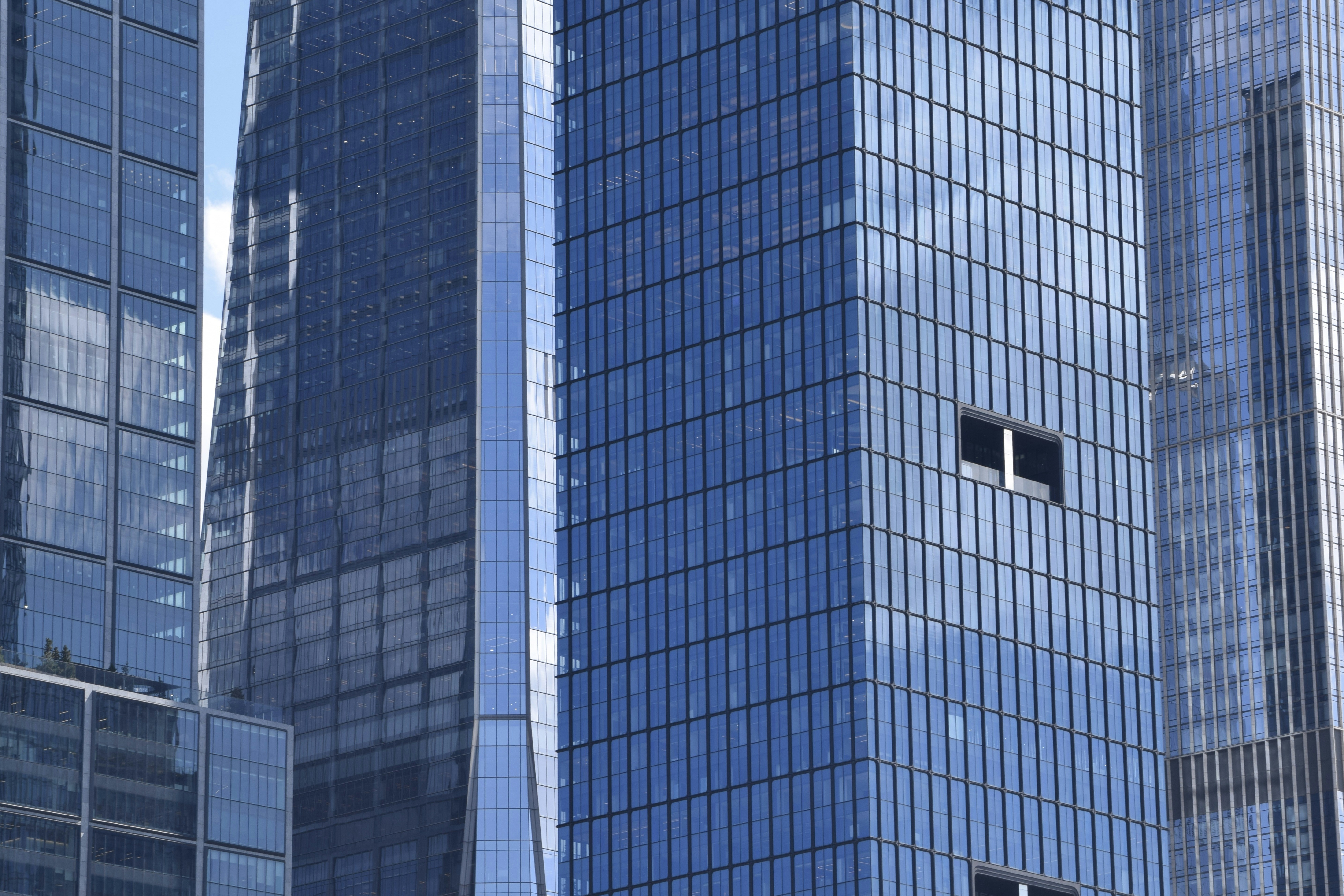 Blue Facade Convergence in a City Canyon