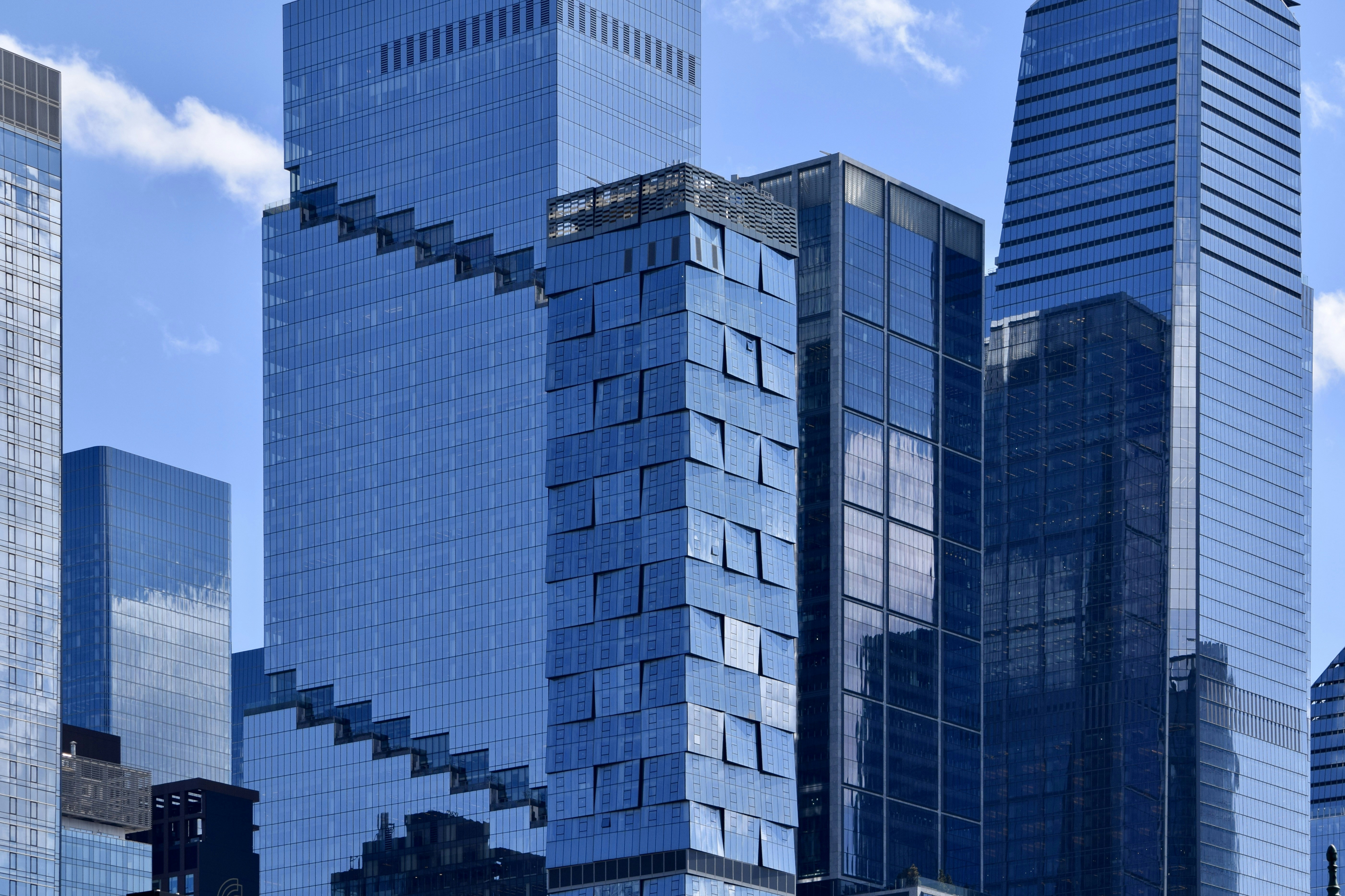 Blue Facade Constellation: A City of Glass Monoliths