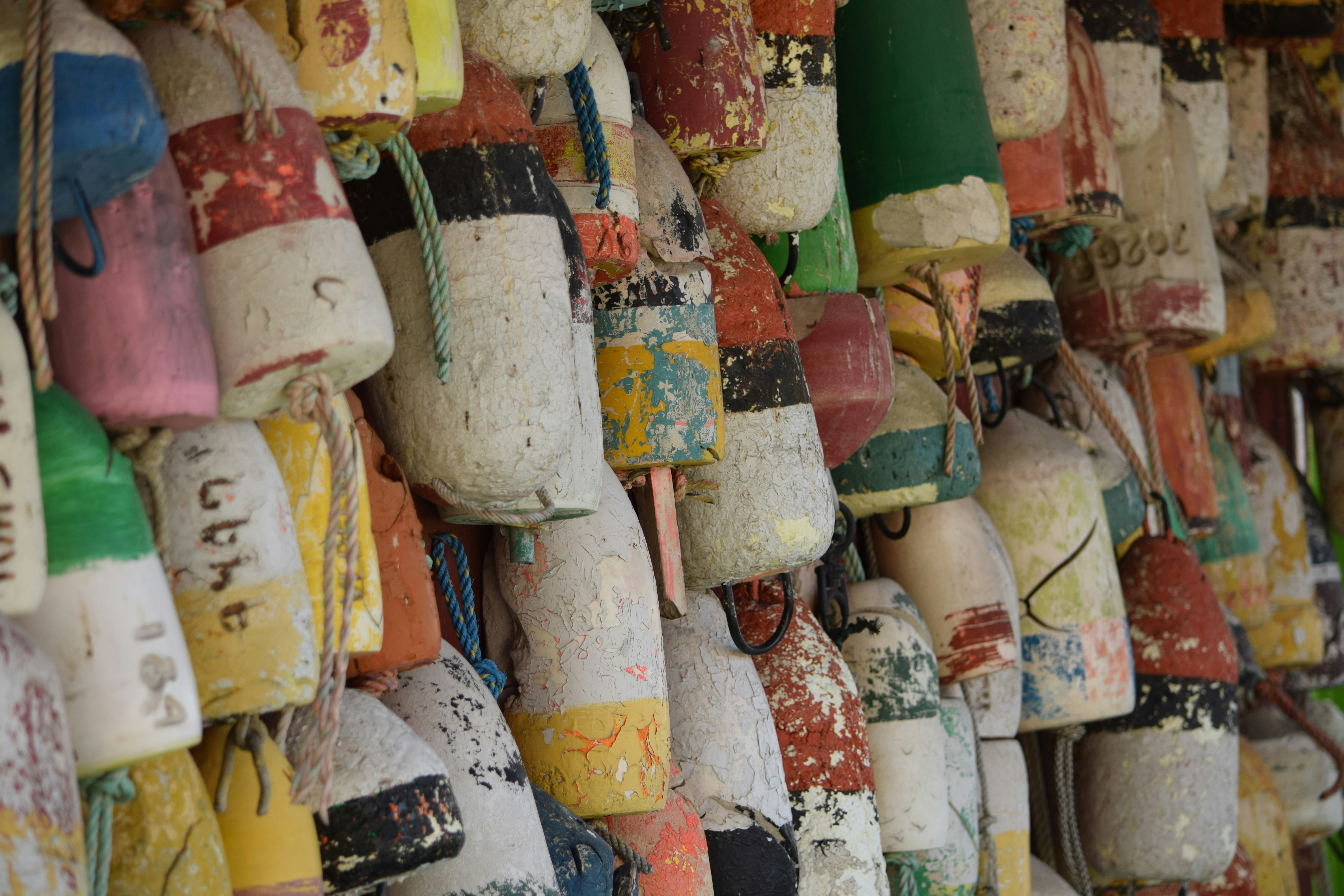 Colorful Buoy Collage: A Sea of Weathered Floats