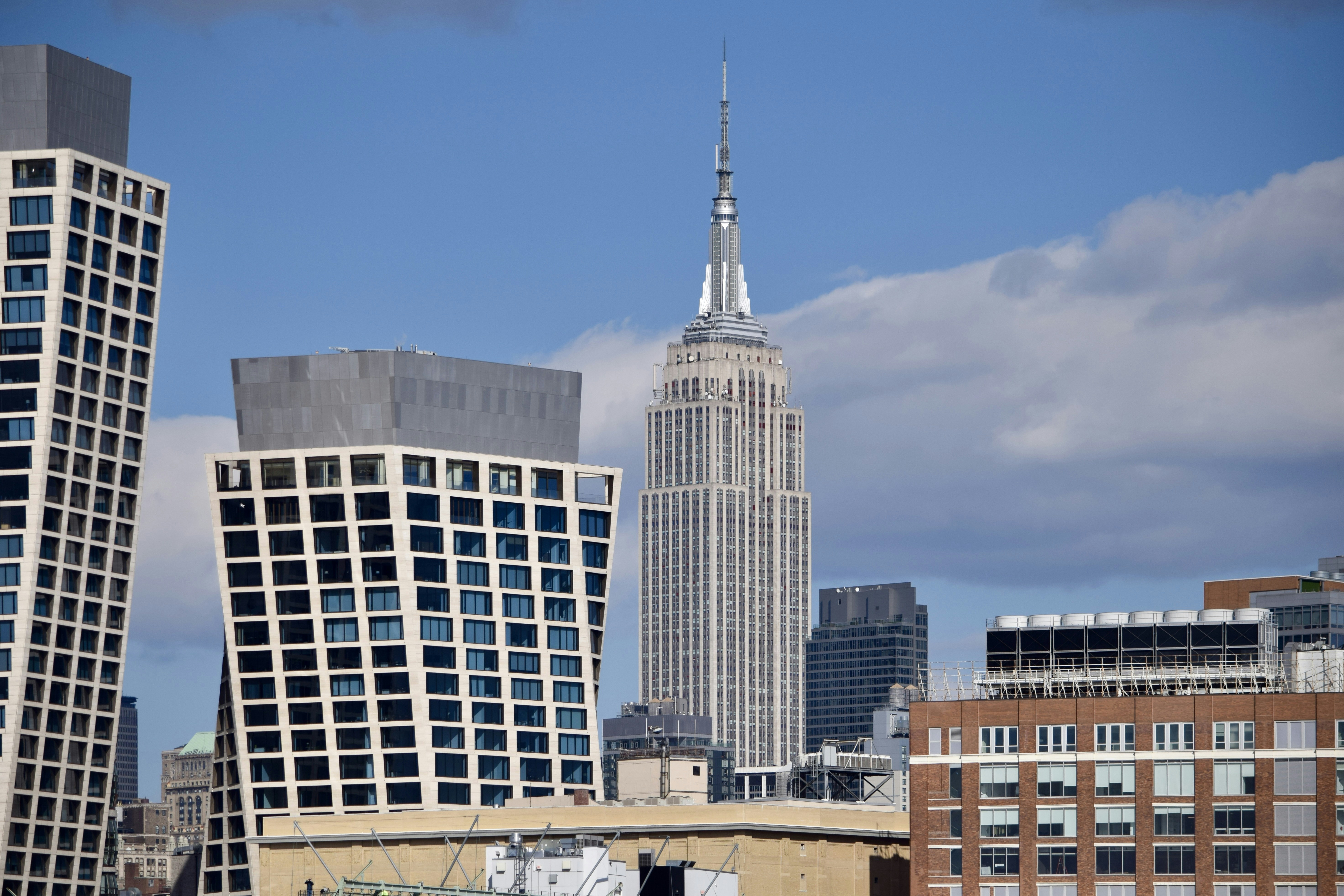 Empire of Glass and Steel Rises Above the Rooftops