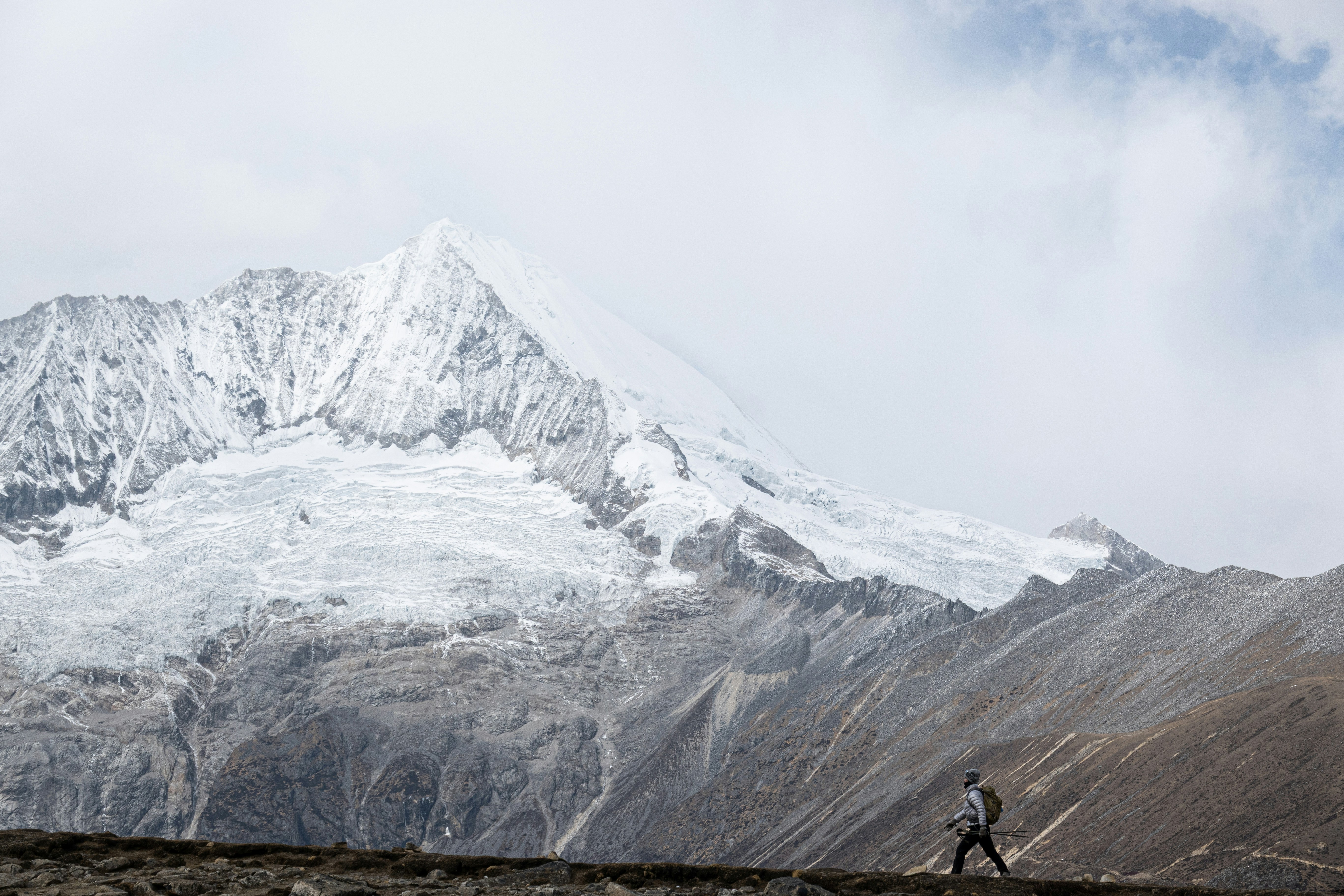 Foothill Trek under a Glaciated Summit