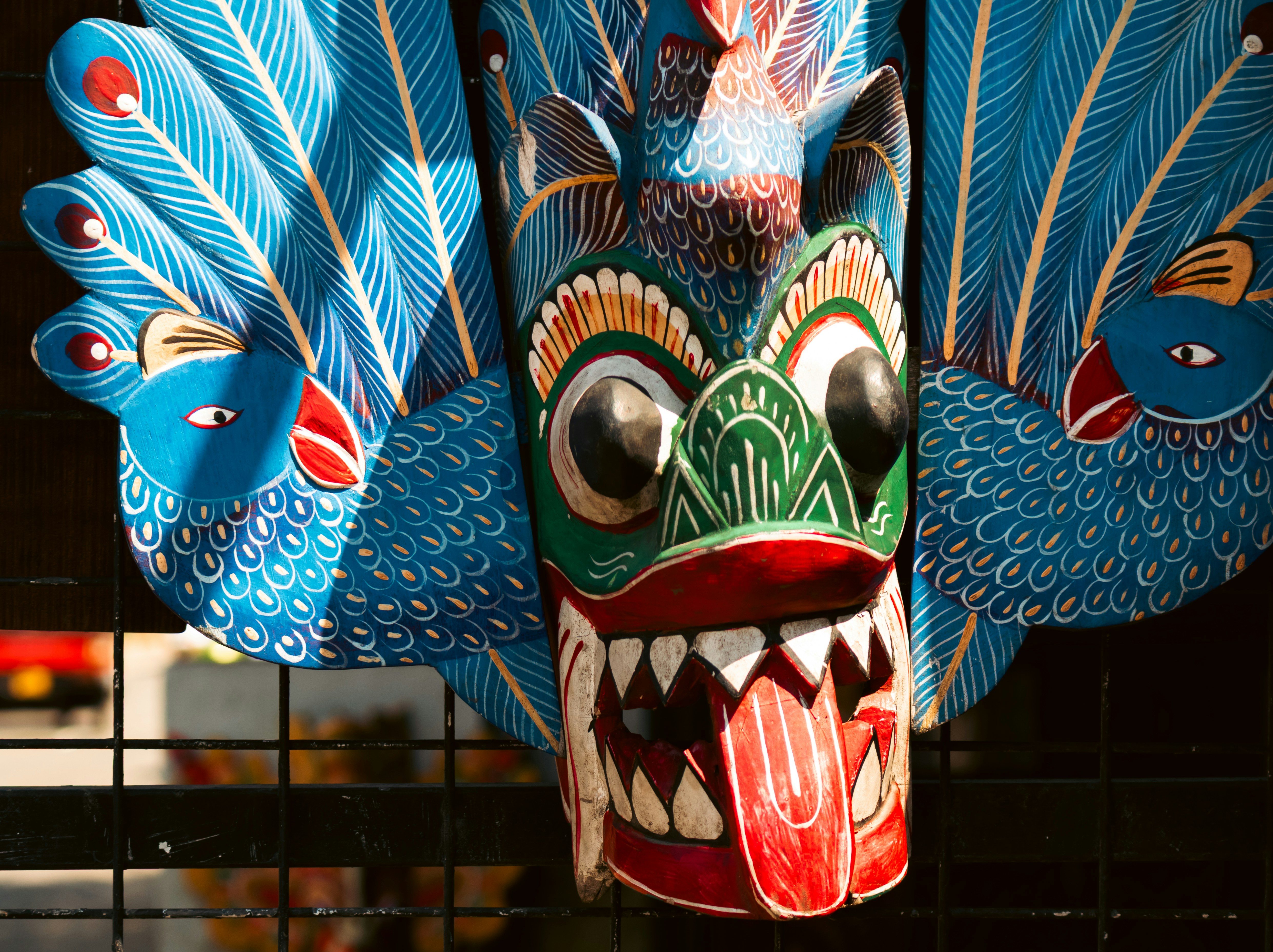 Ceramic Dragon of Colorful Fangs and Feathers