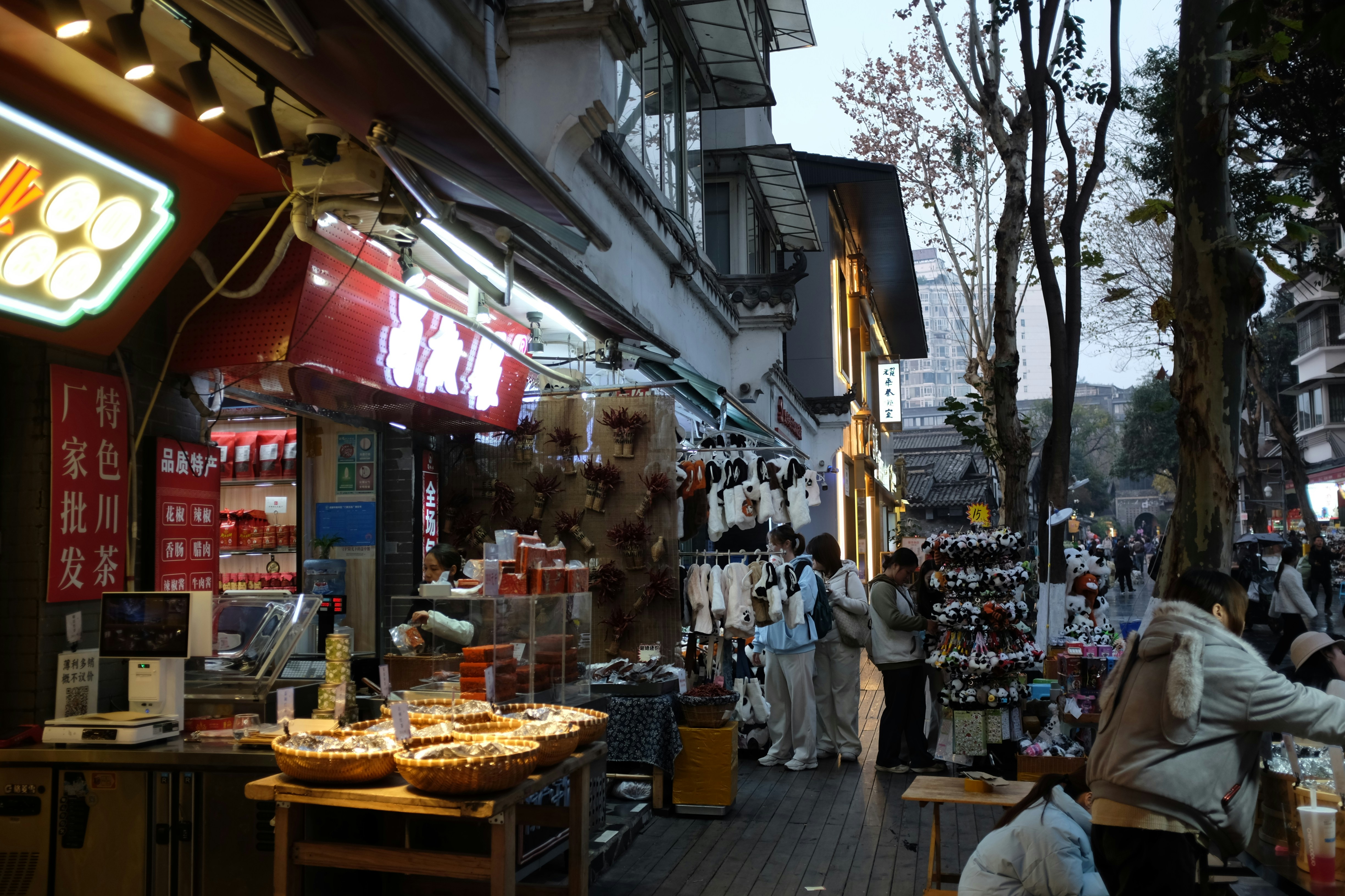 Evening Market Glow: Street Vendors and Stalls Under Neon Signs