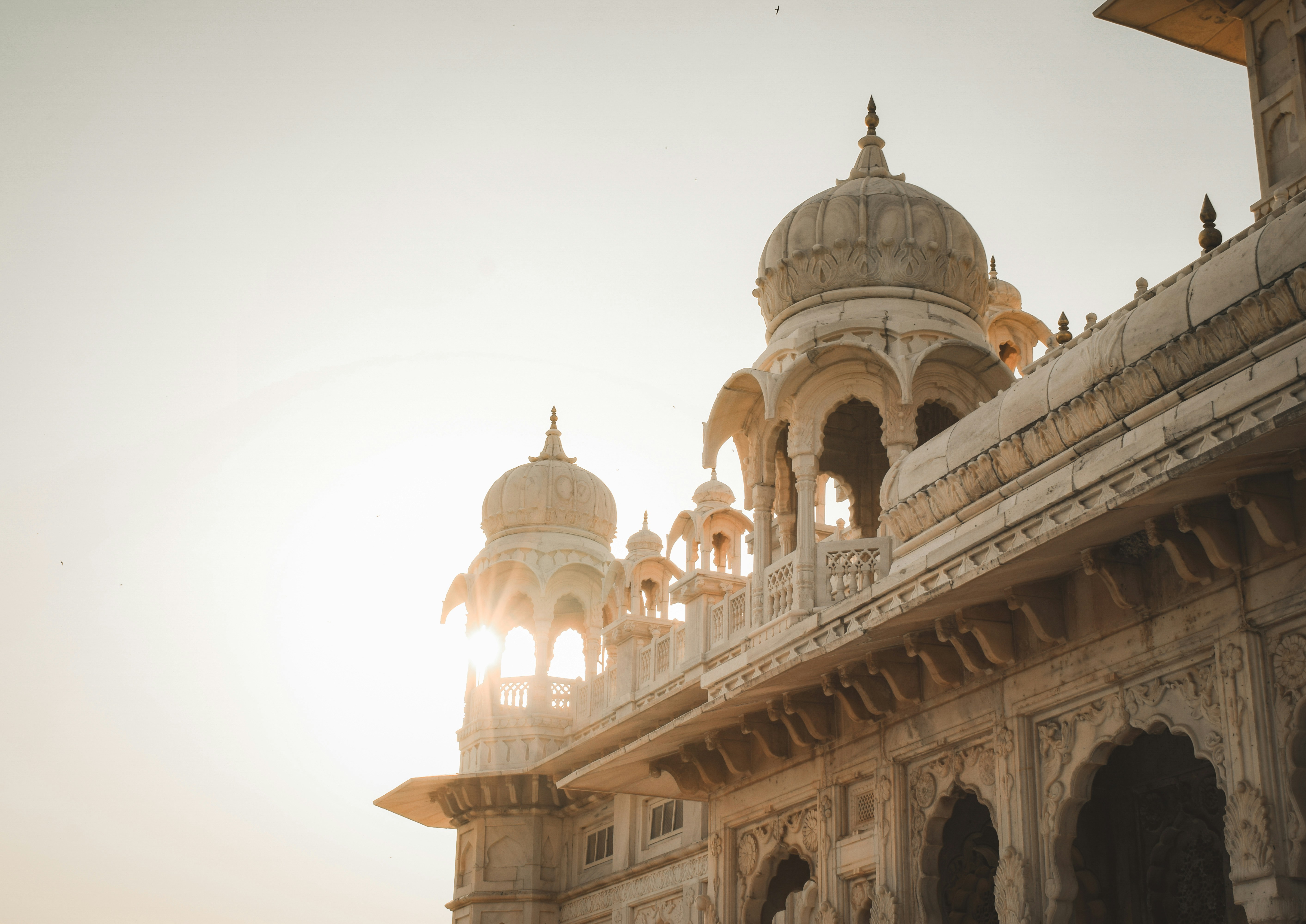 Sunlit Domes: The Carved Facade in Evening Light
