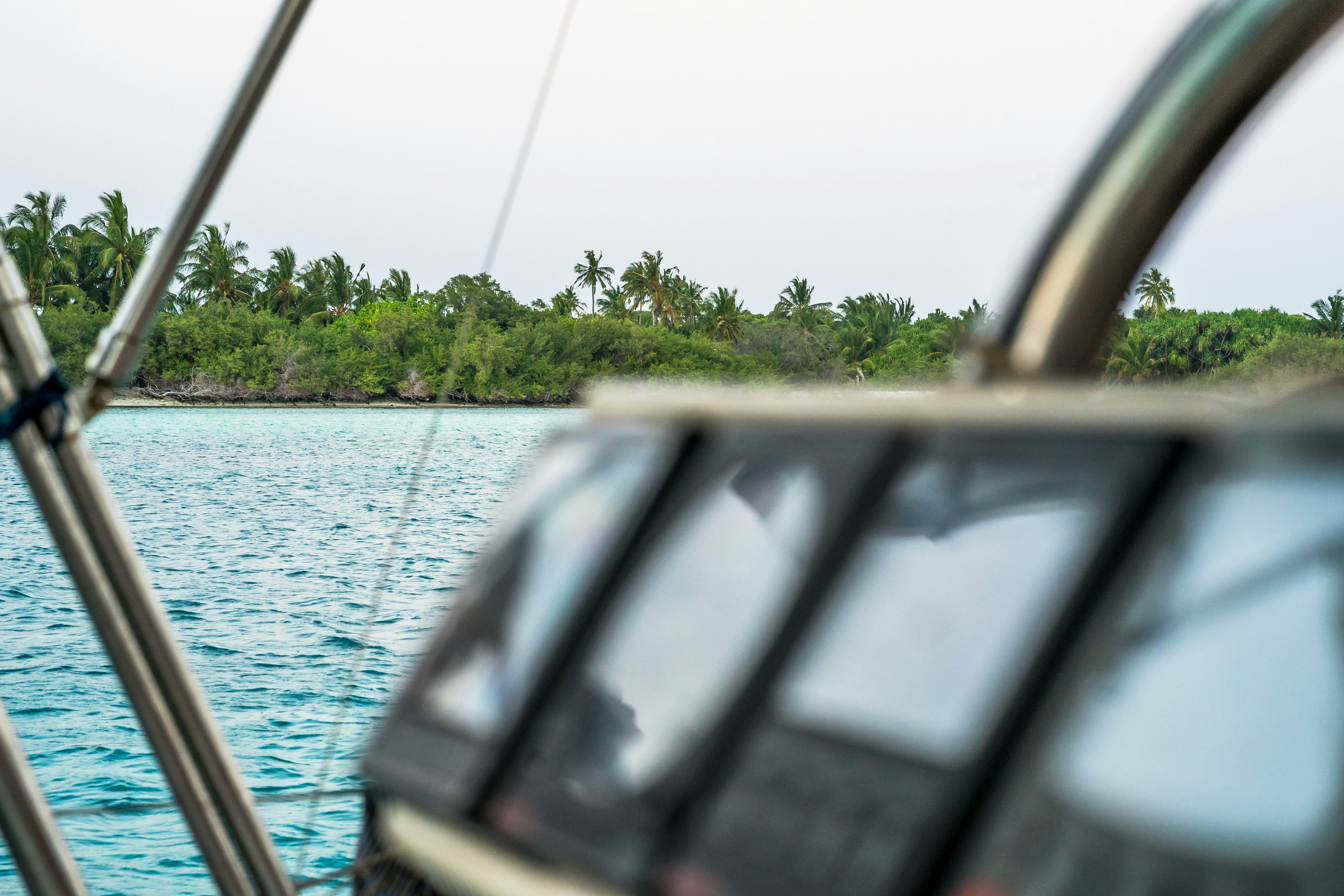Beyond the Vessel: Teal Waters and Framing Glass