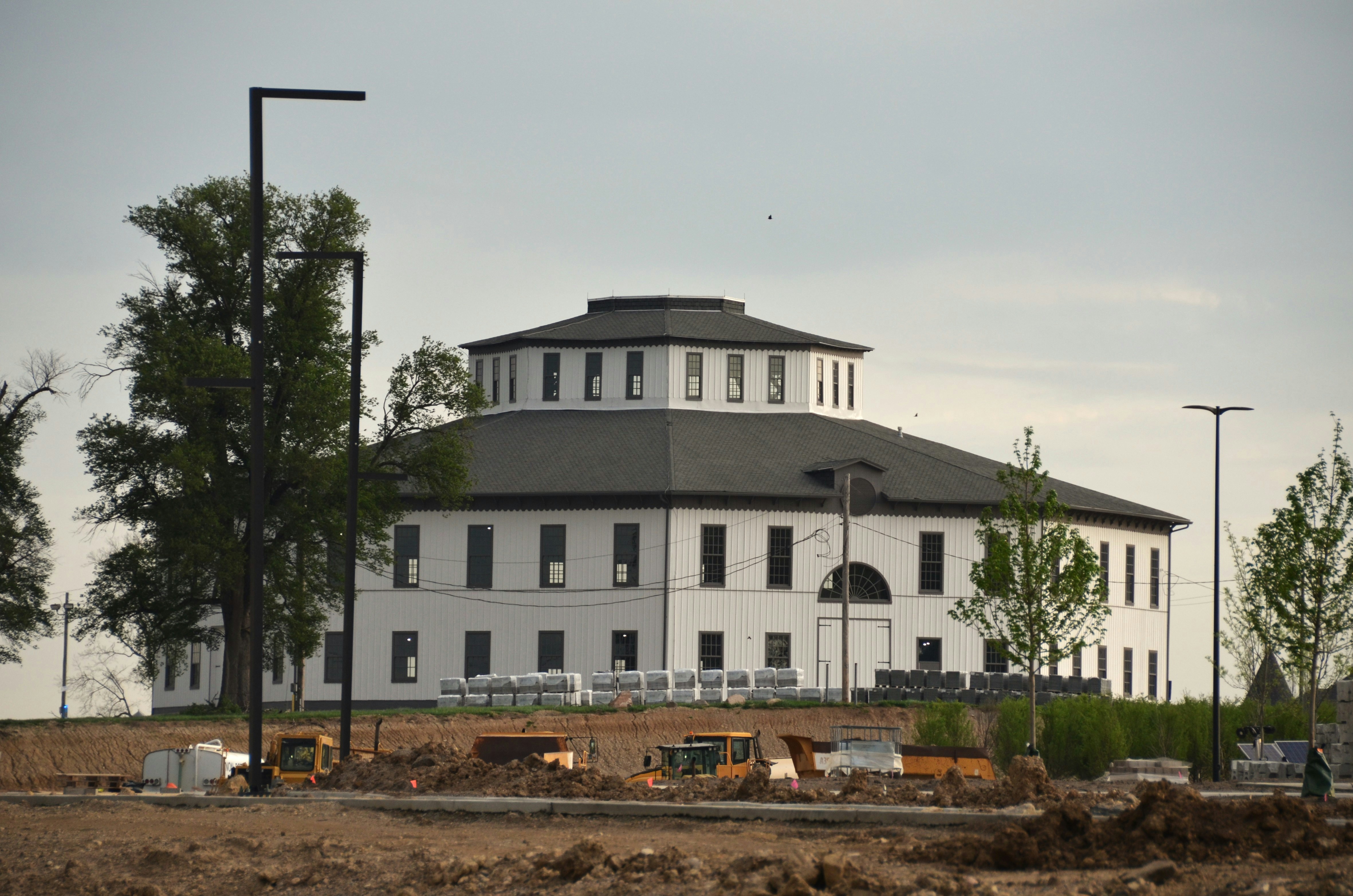 Under Construction: A White Territorial Building Rising Over a Worksite