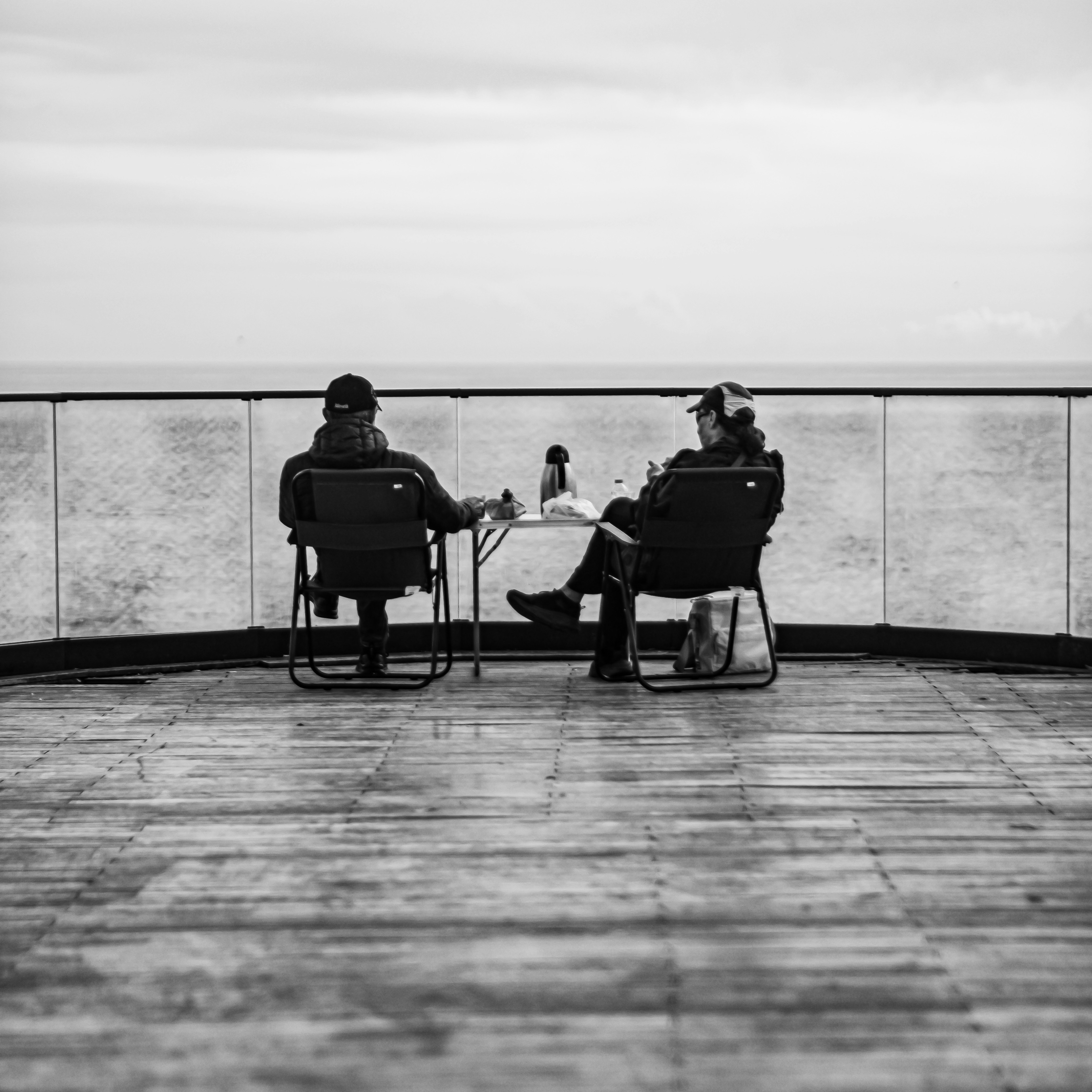 Seated Conversation on the Waterfront Deck