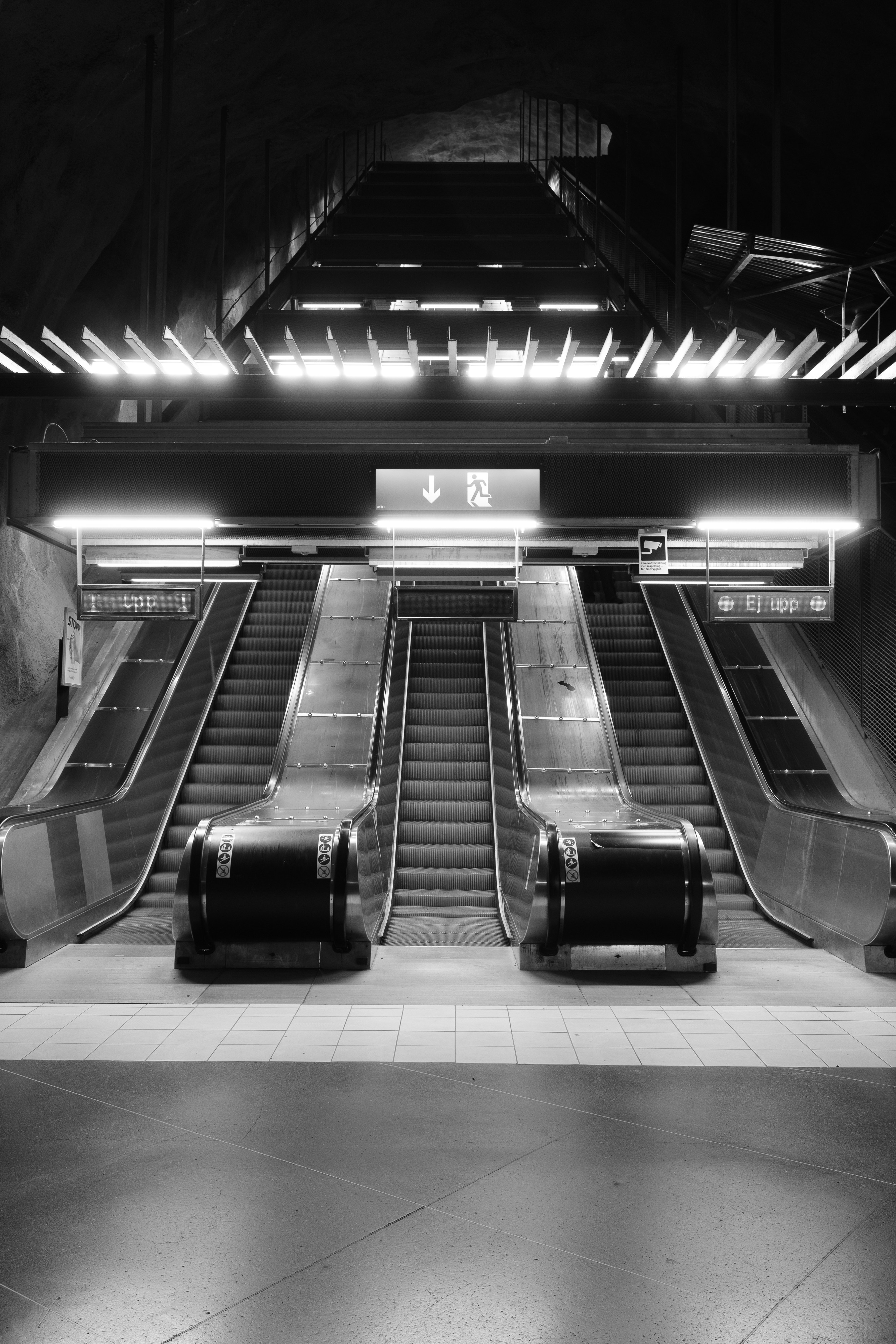 Ascending to the Quiet Depths: An Underground Transit Confronts the Light