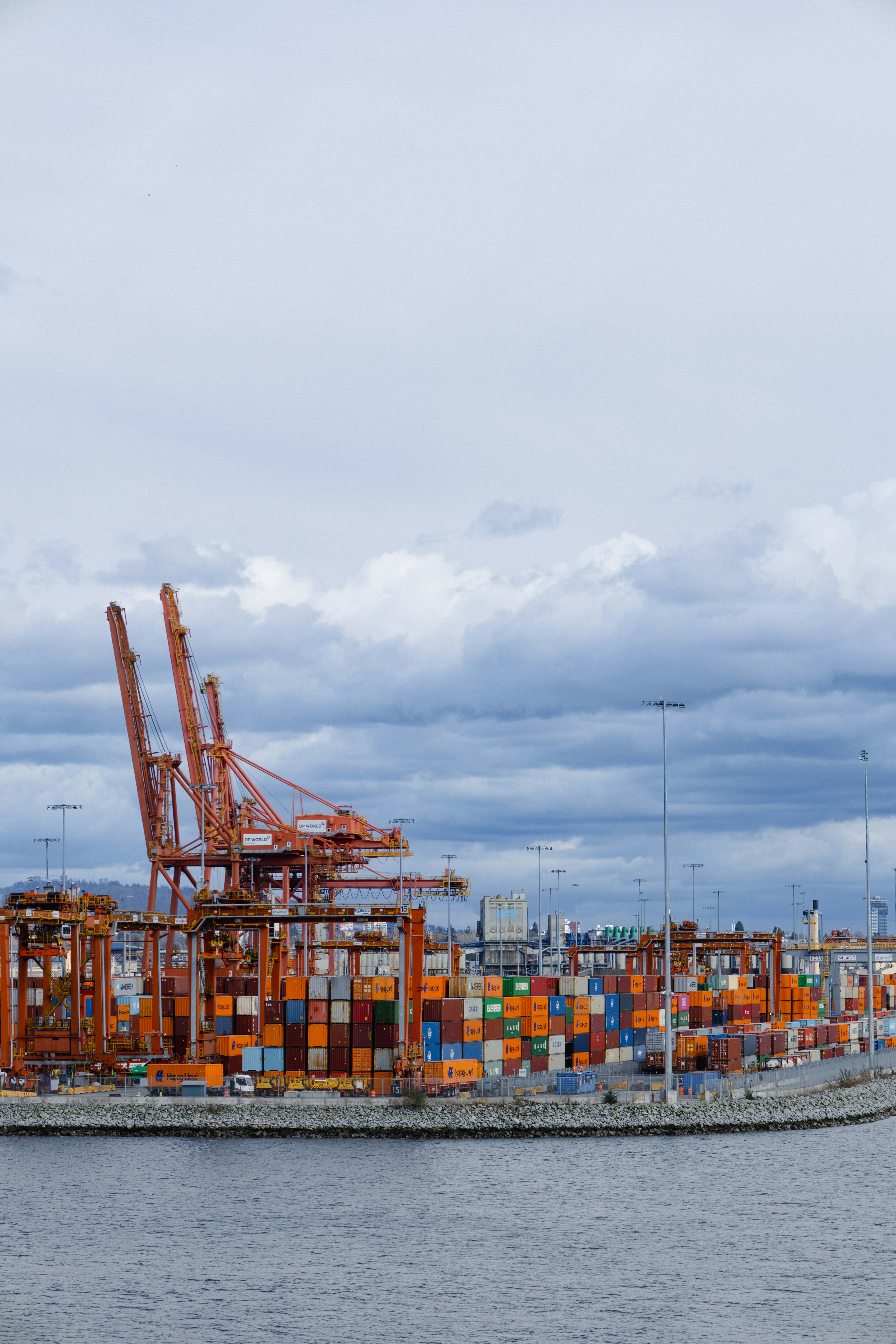 Containers and Cranes at Distant Dockyard Horizon