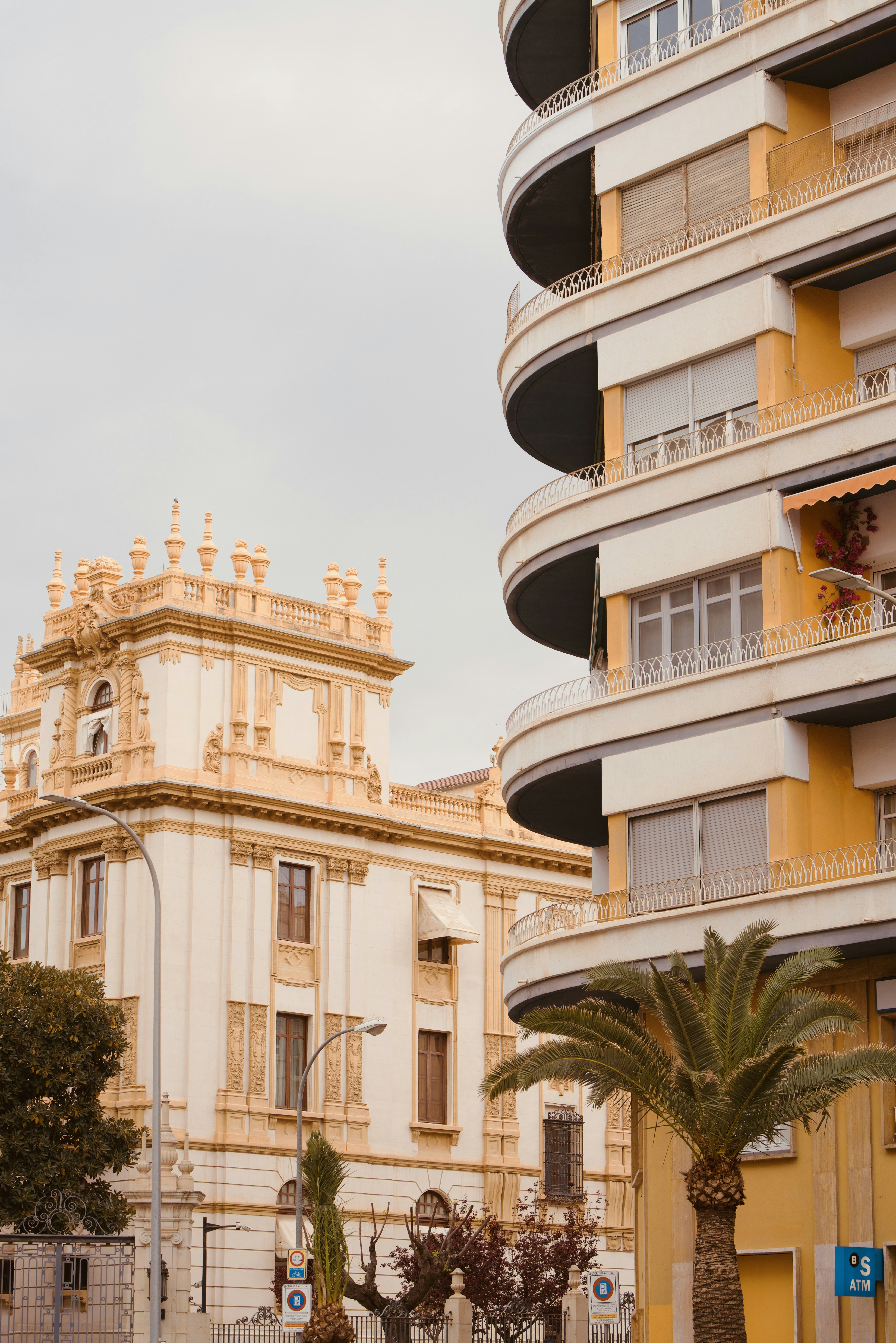 Curved Concrete and Classical Facades: A City Slice