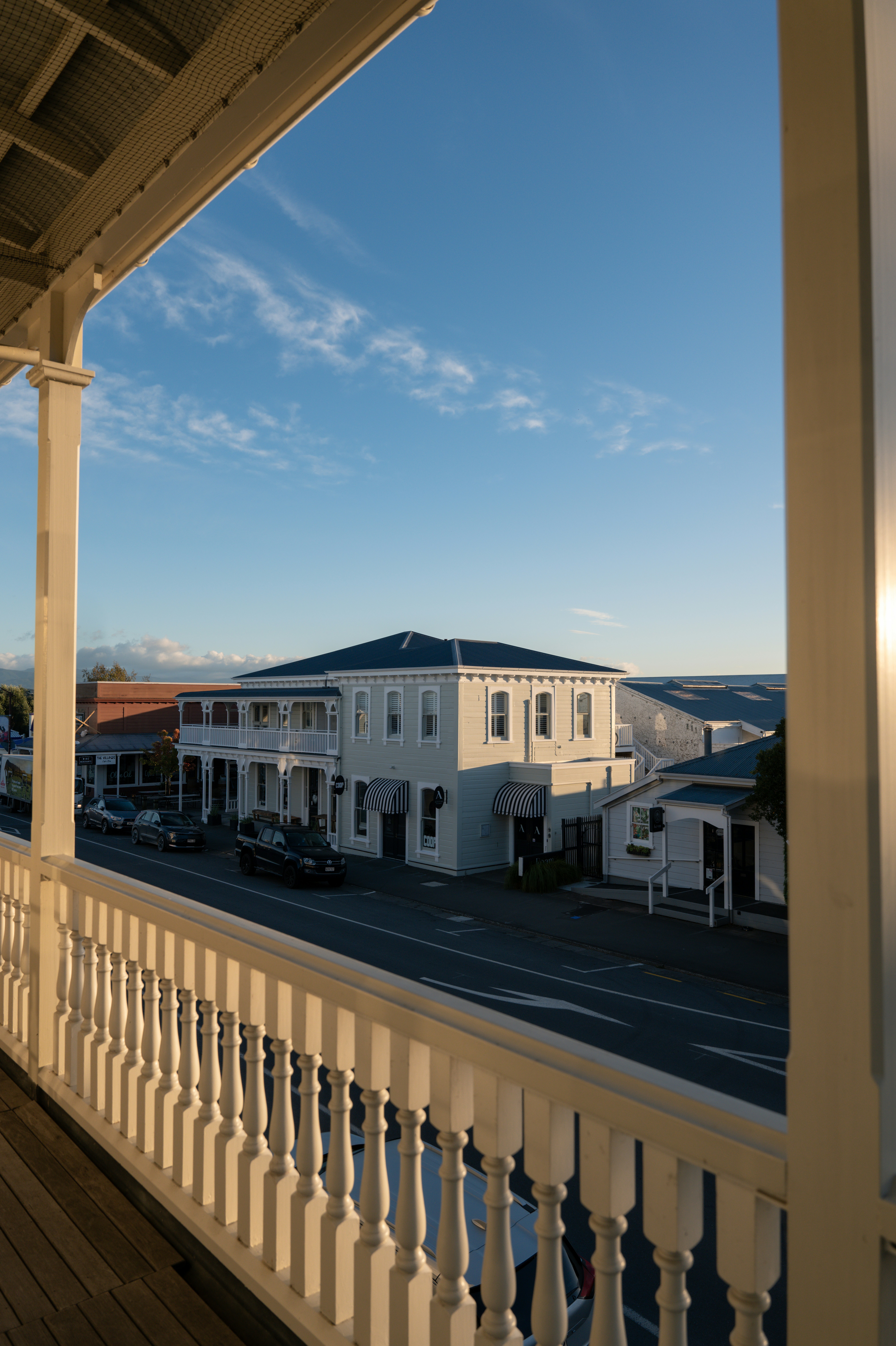 View from a Coastal Veranda Overlooking a Quiet Main Street