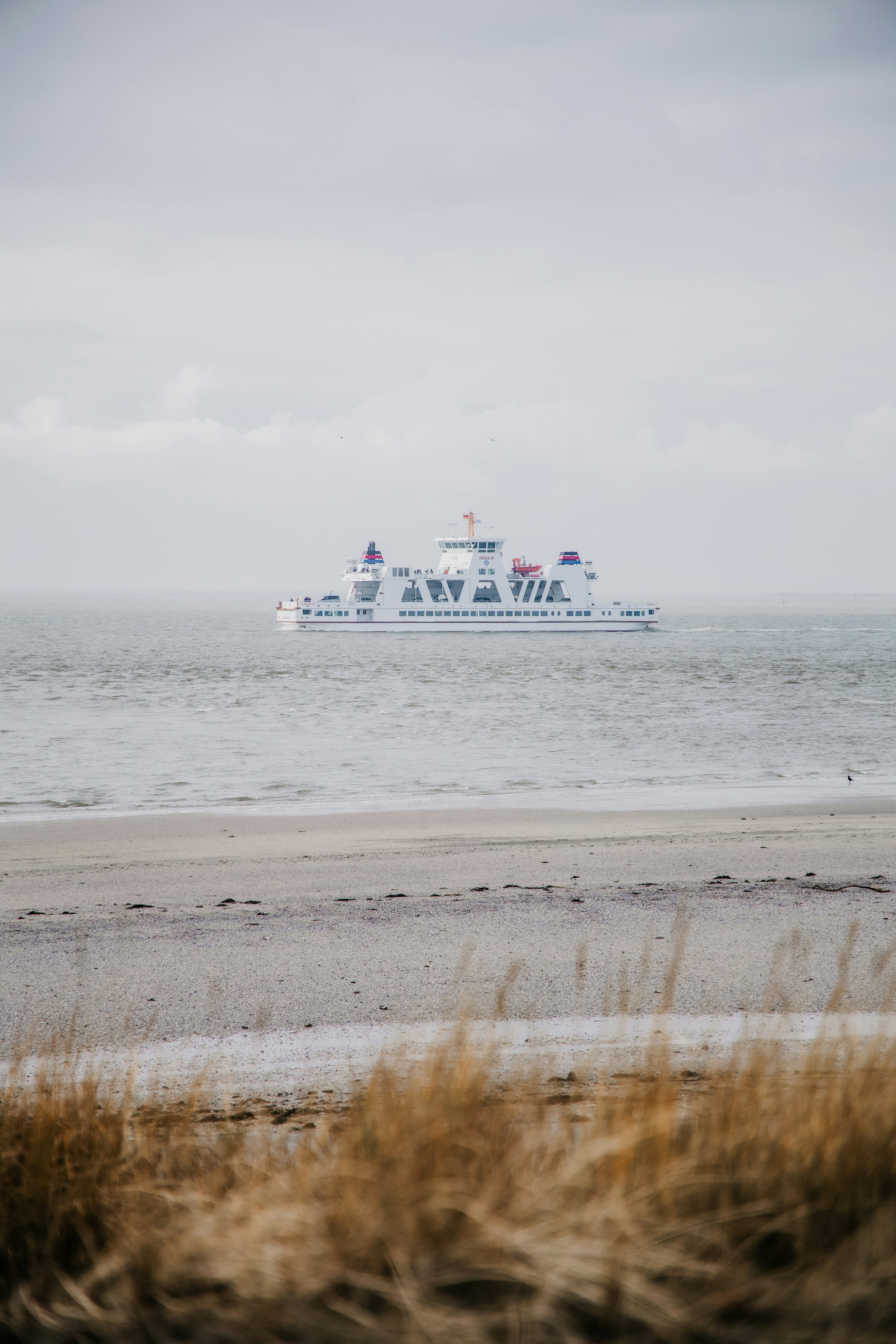 Passenger Ferry Crossing the Quiet Horizon