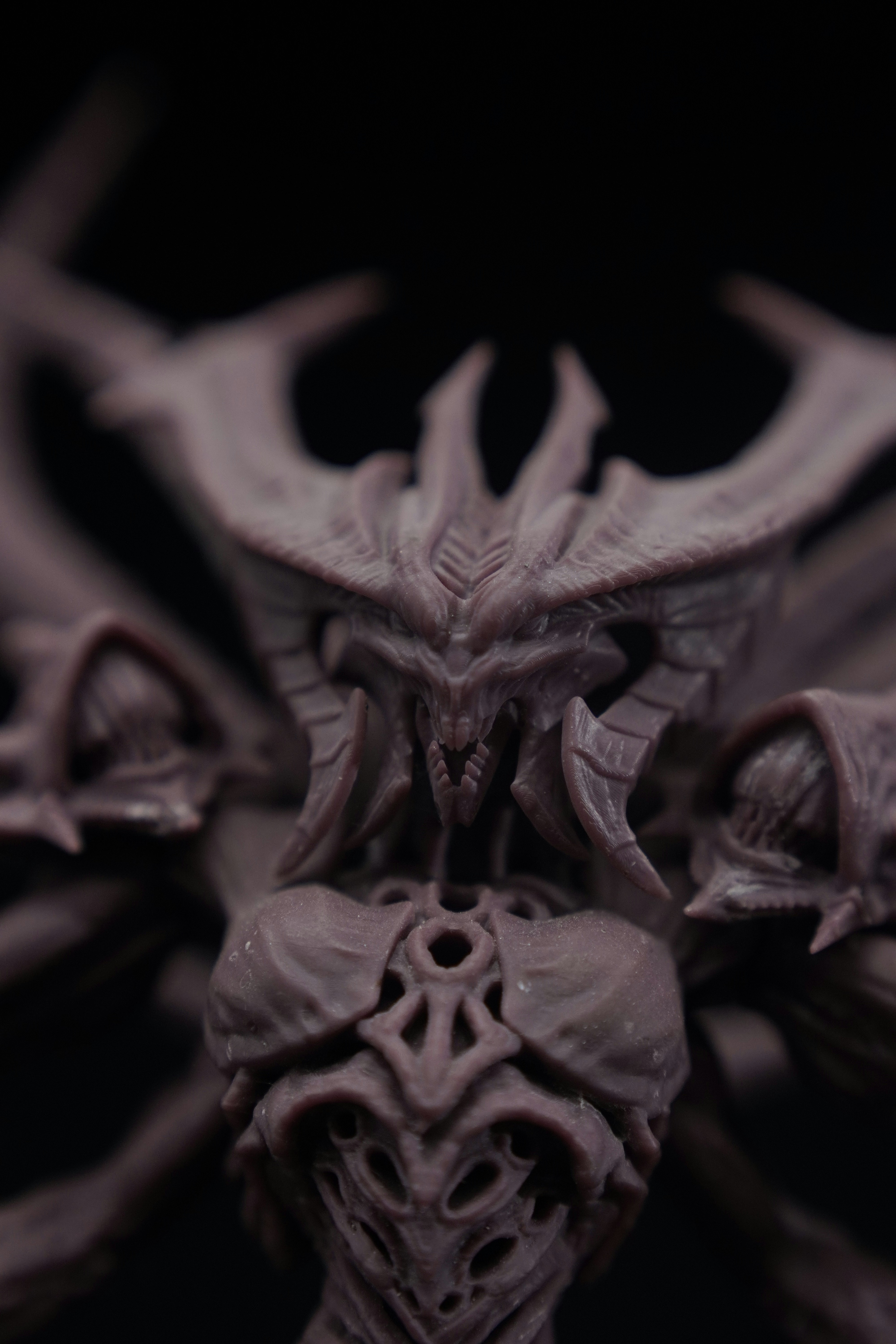 Dark Facets: A Close-Up of the Carved Midnight Creature