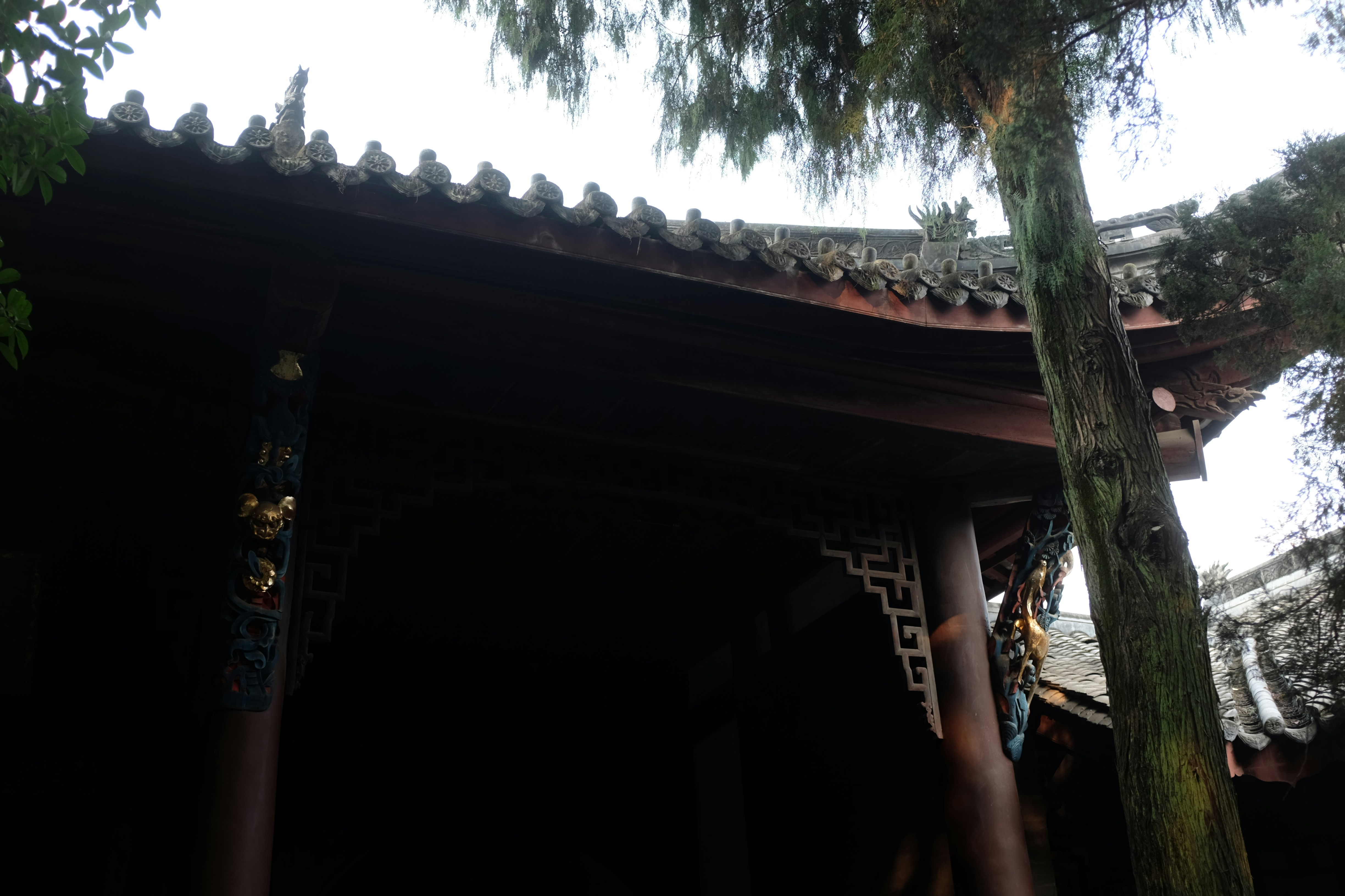 Shaded Temple Nook Under Urban Canopy