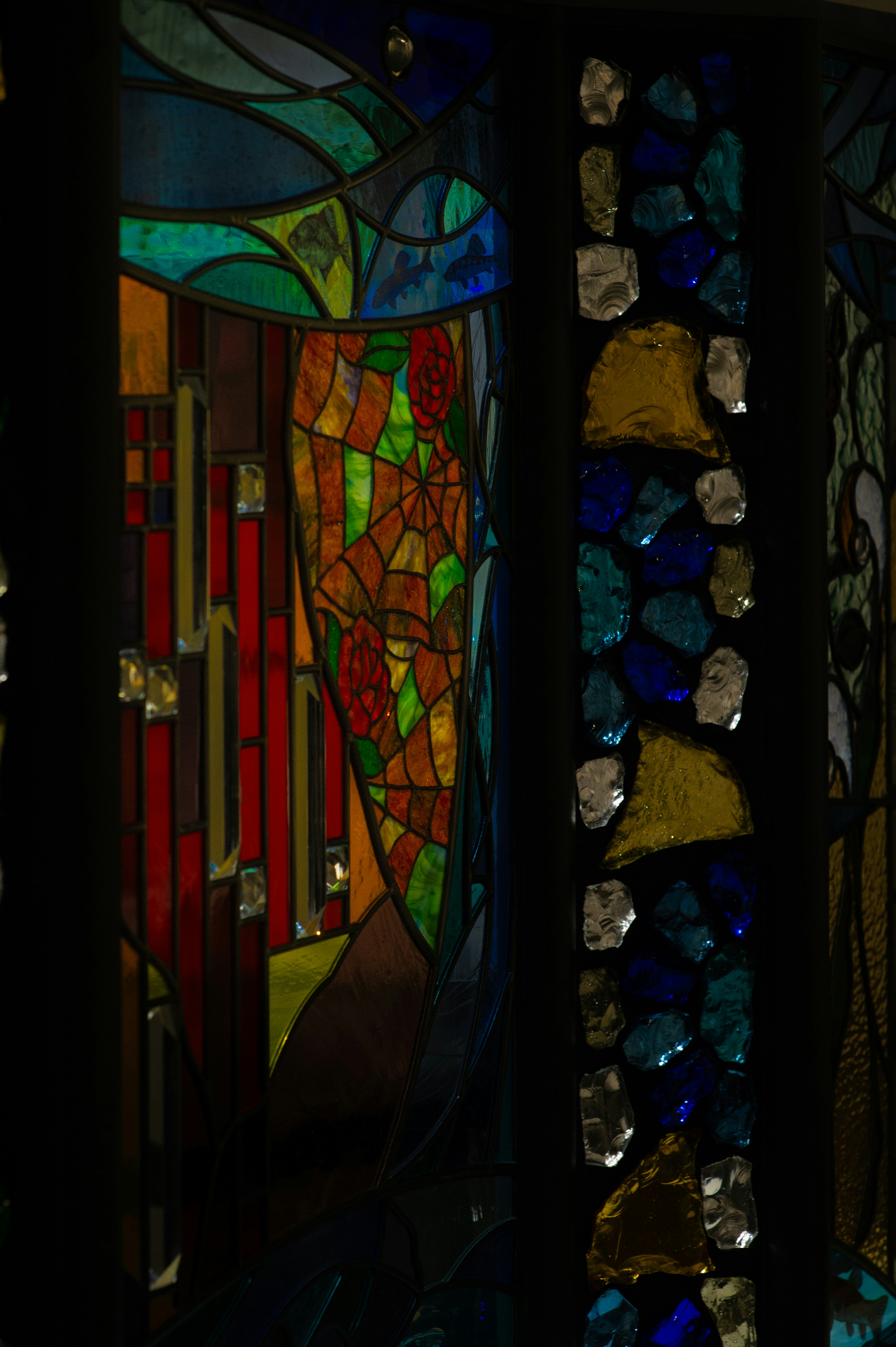 Vivid Cathedral of Glass: Abstract Stained Light in Darkened Hall
