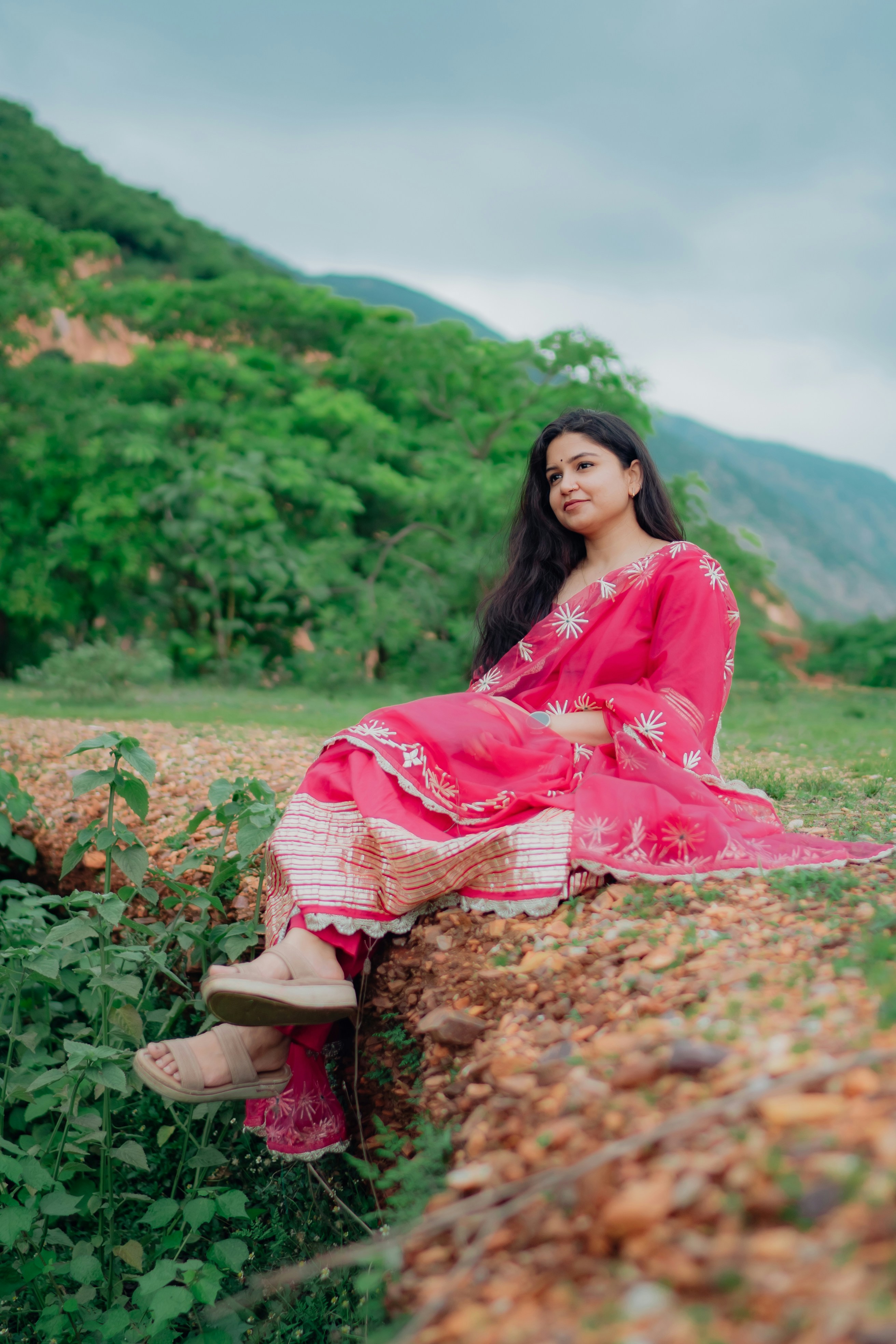 Pink Sari at the Edge of Green Hills
