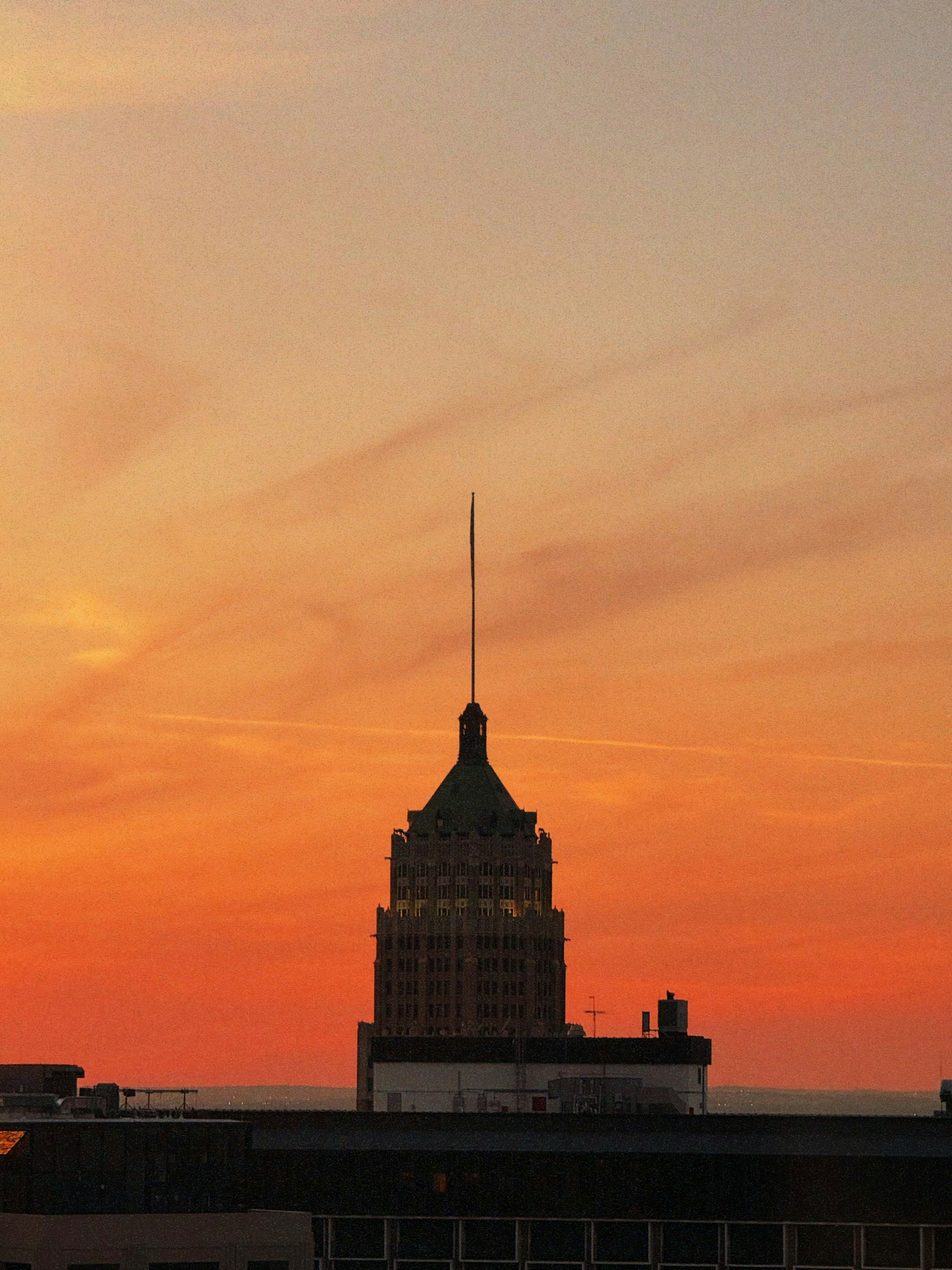 Sunset Spire: A City Skyline Crowned by a Central Tower