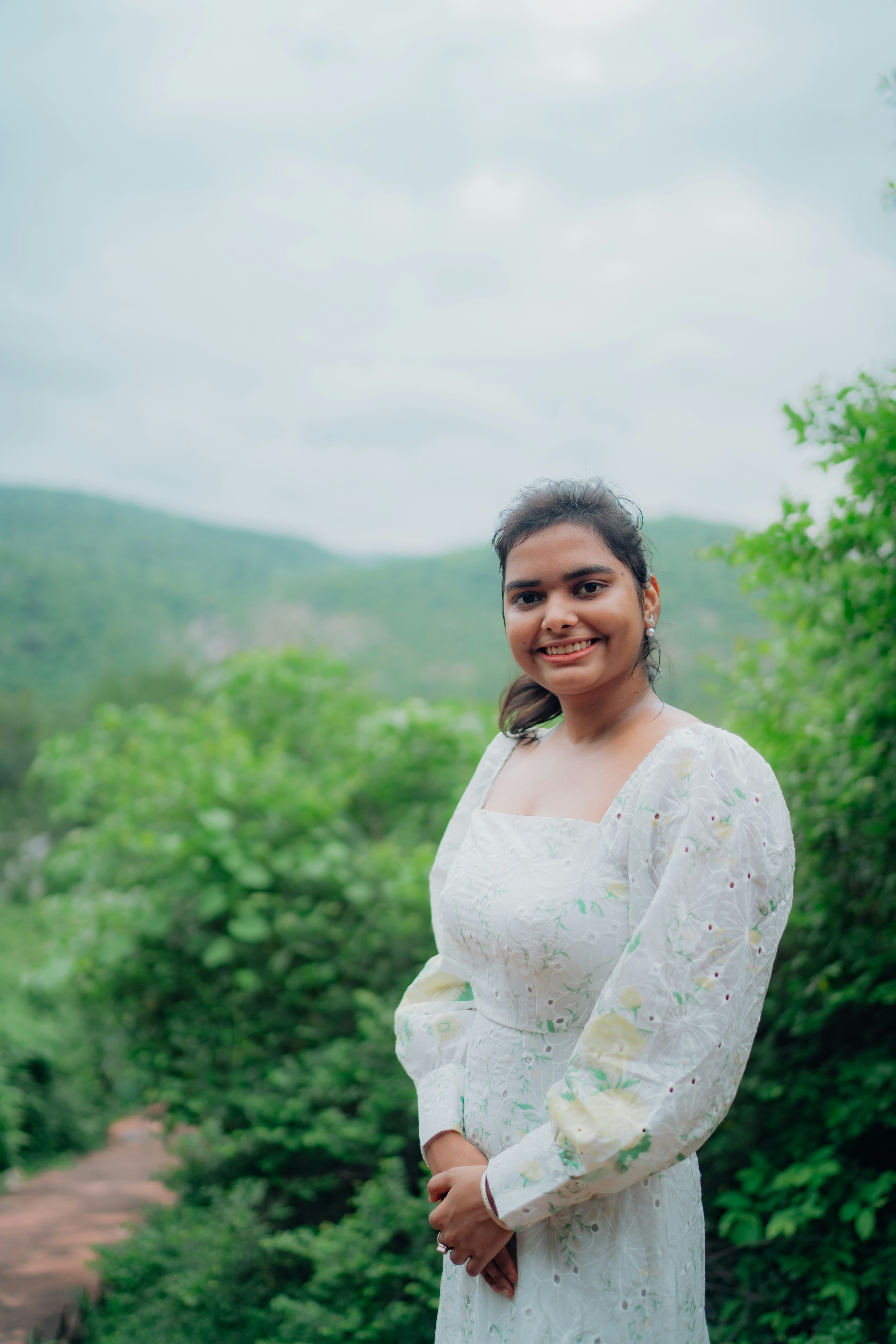 Portrait in Quiet Green: A Smile Against the Hills