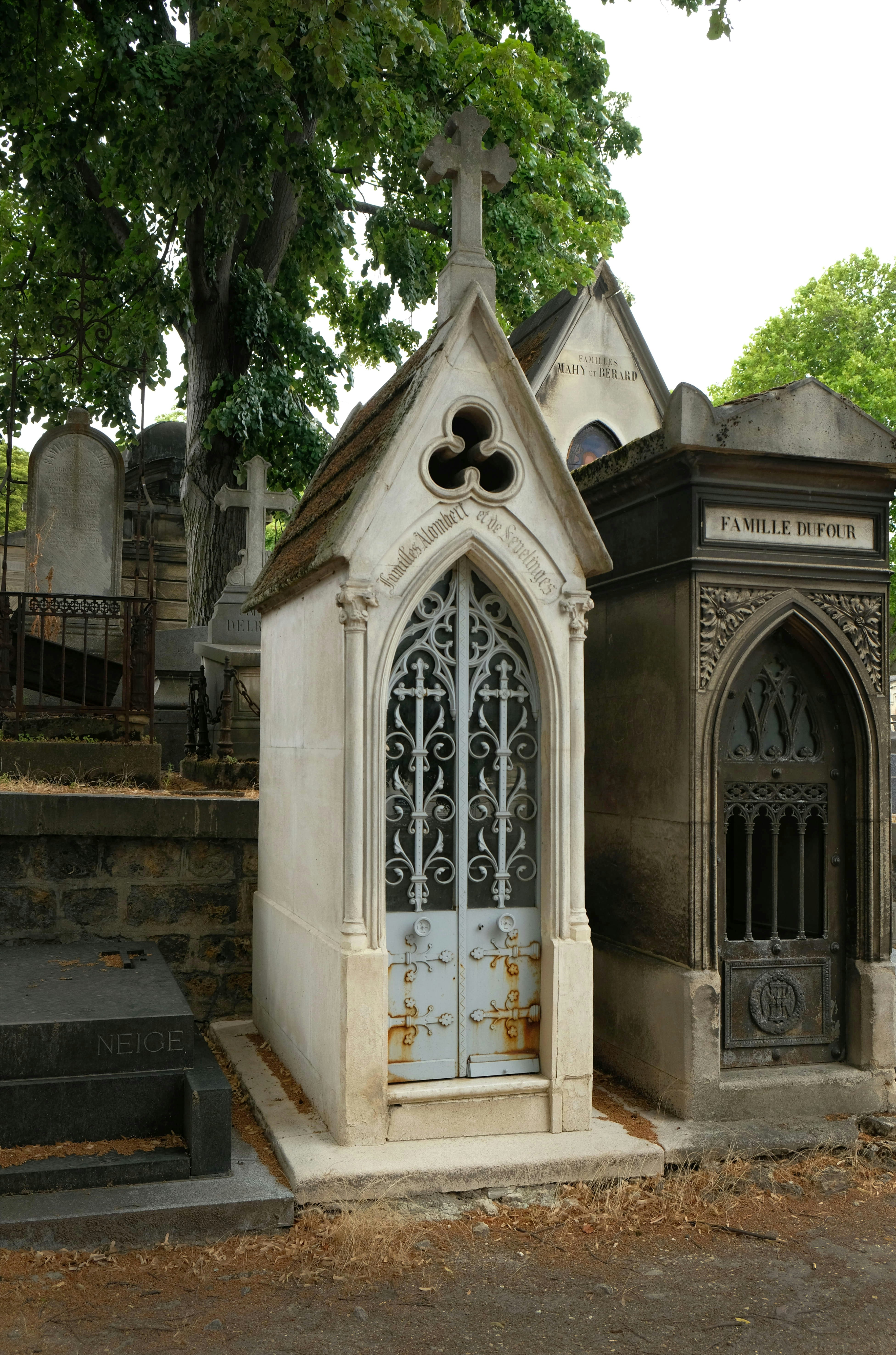 Central Gothic Mausoleum Framed by Ancient Oaks in a Quiet Cemetery