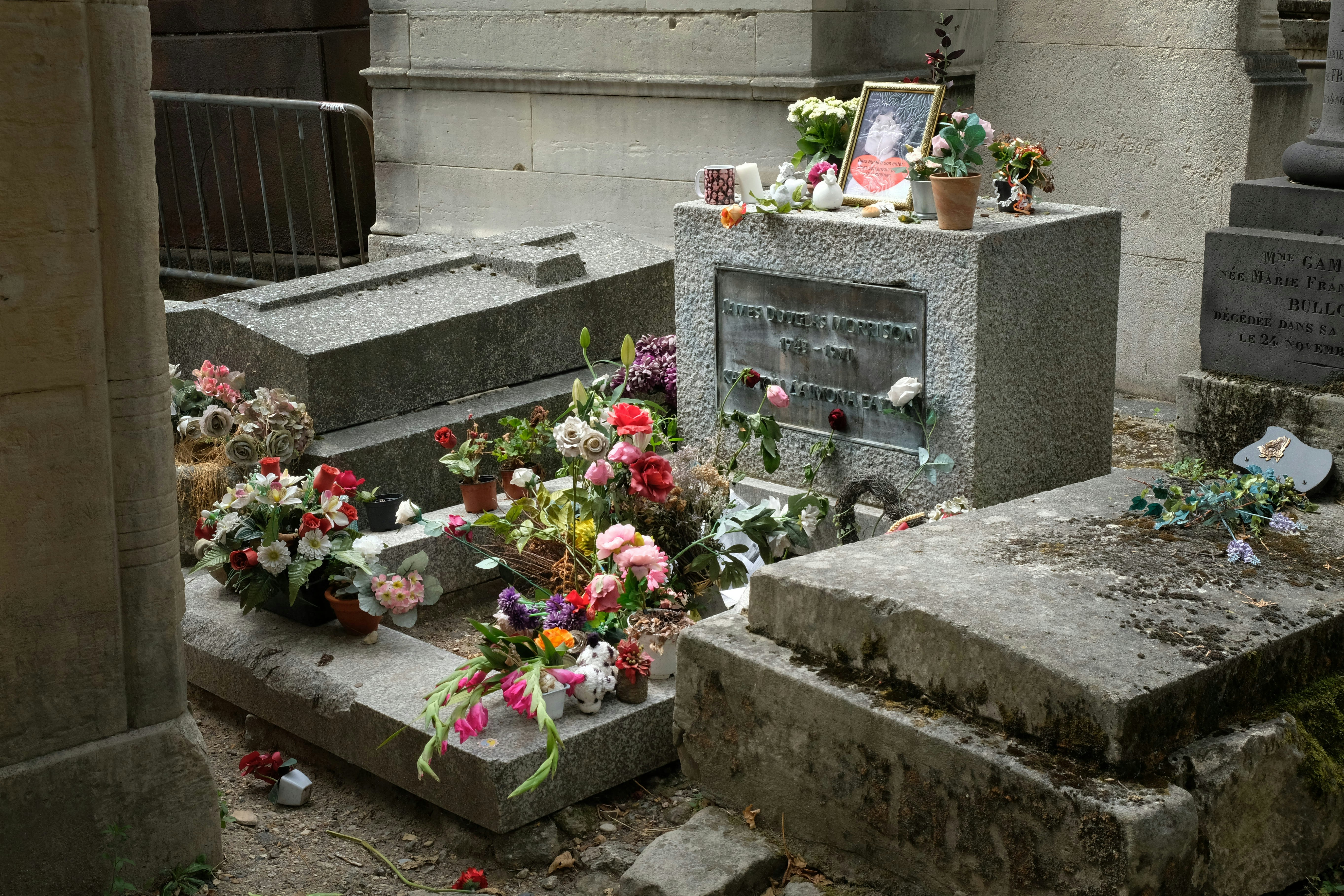 Floral tribute at a quiet cemetery monument