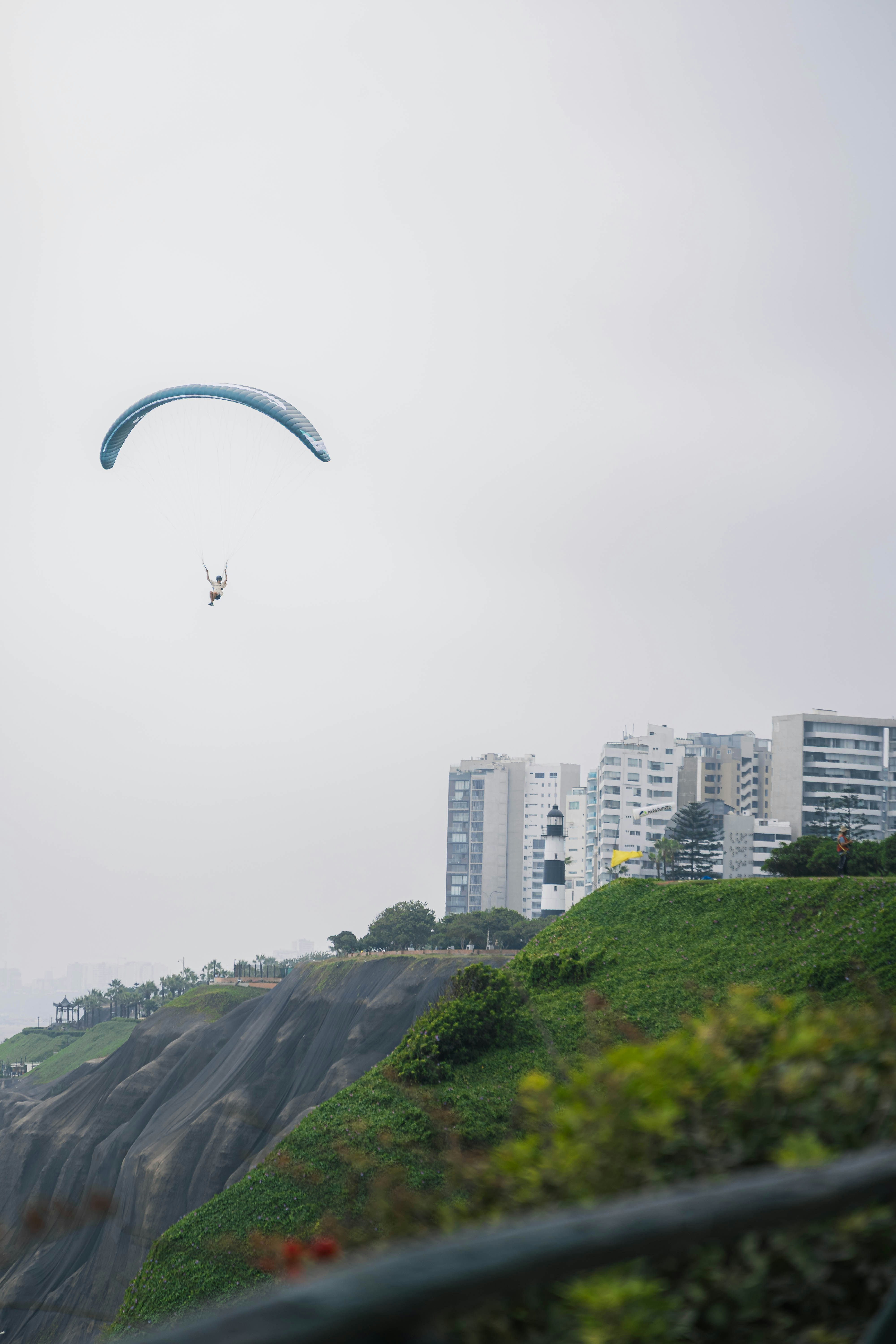 Soaring Over the Cliffside City
